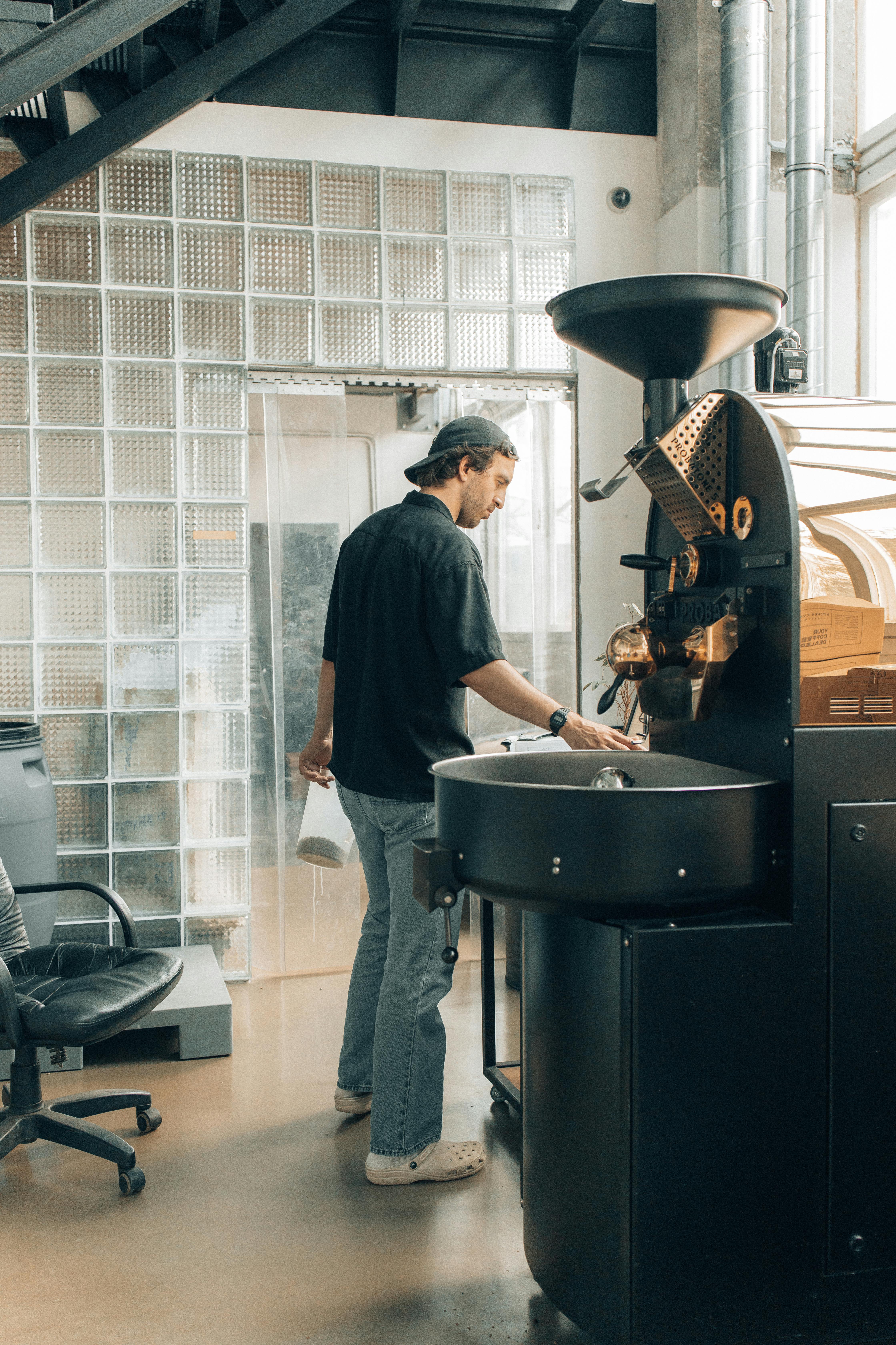 Man Working in Coffee Production · Free Stock Photo