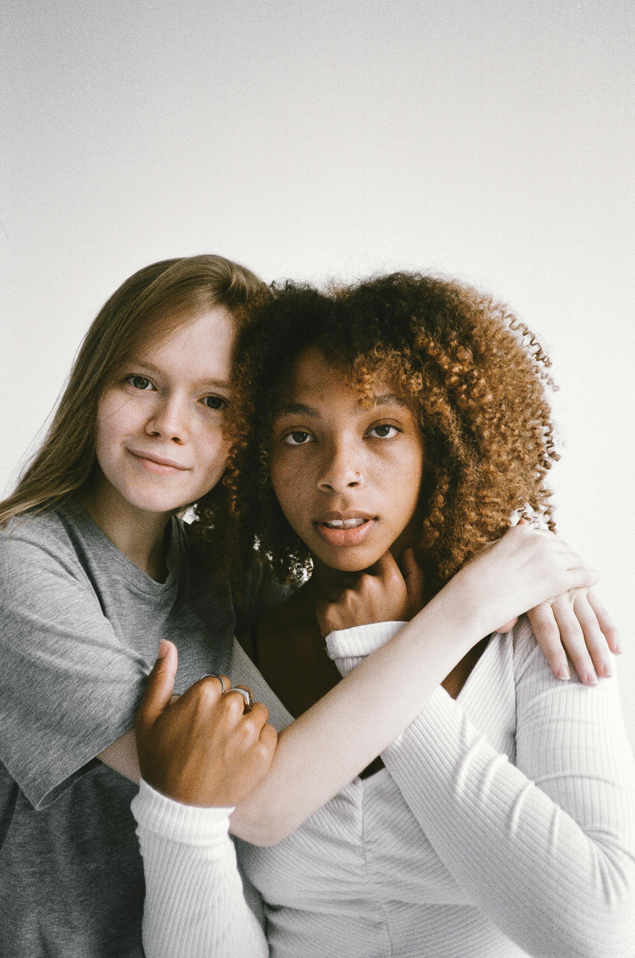 Woman Hugging Another Woman · Free Stock Photo