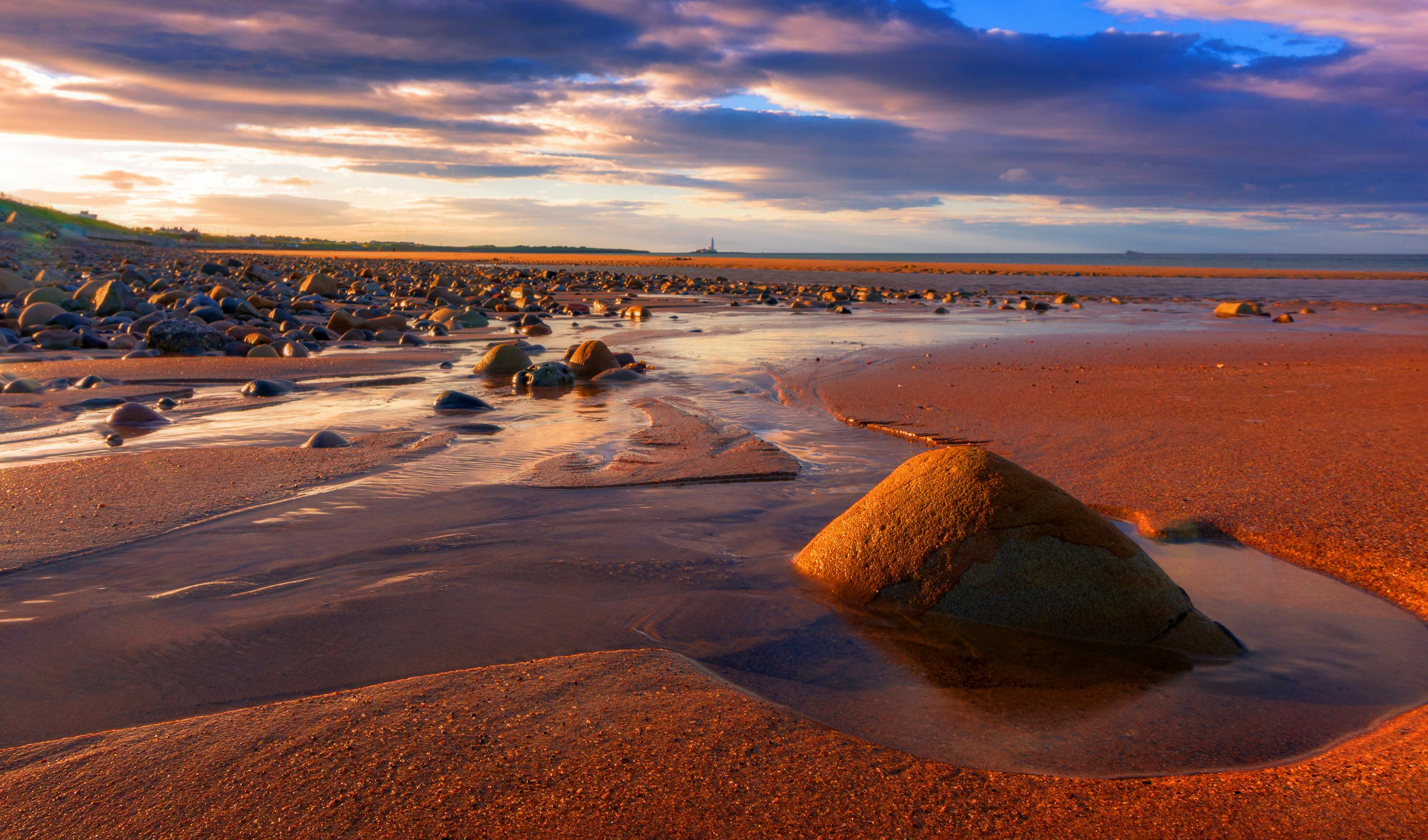 Stones on the Beach at Sunset · Free Stock Photo