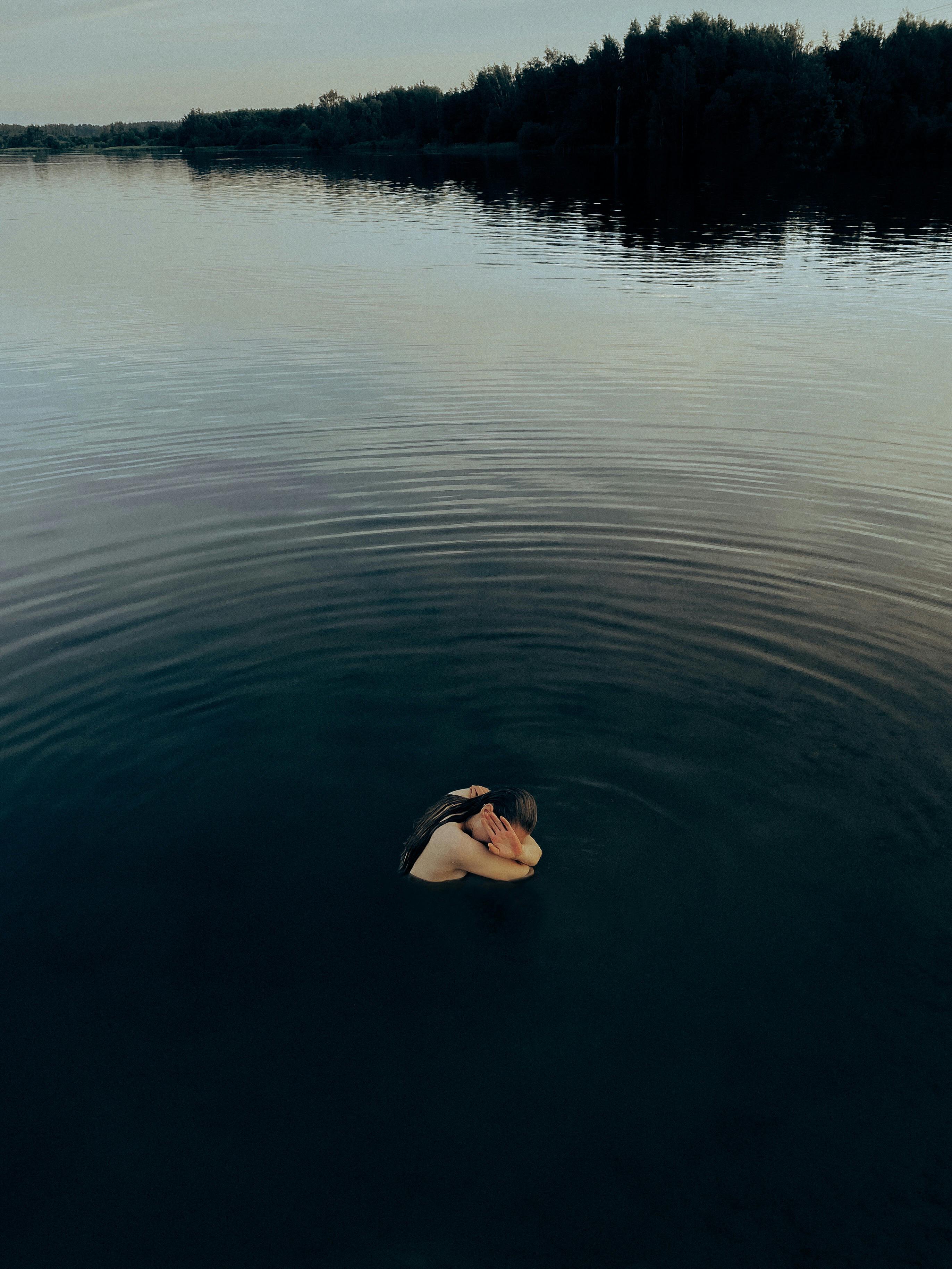Woman Staring at Lake · Free Stock Photo