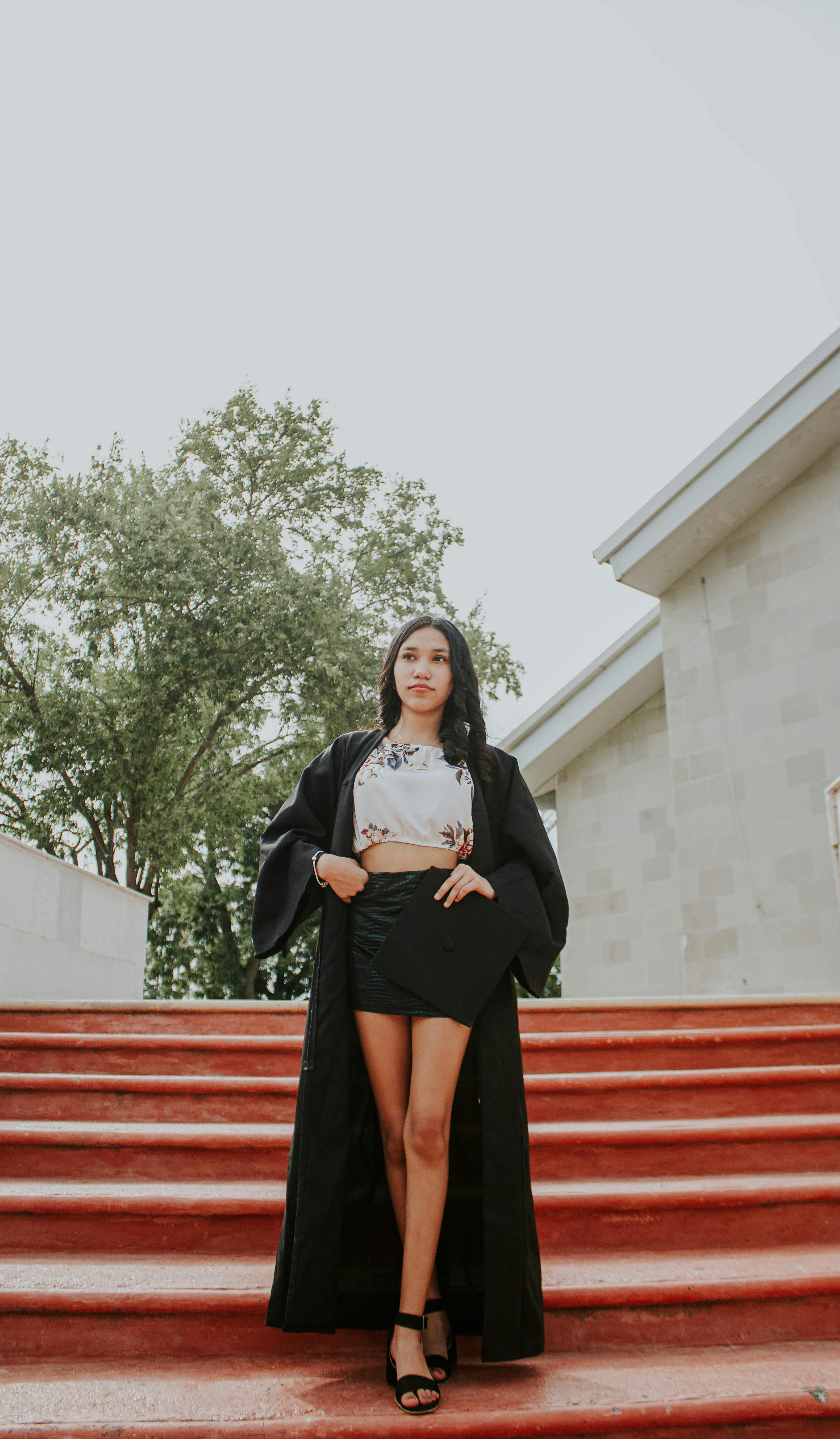 Stylish model walking and posing on stairs · Free Stock Photo