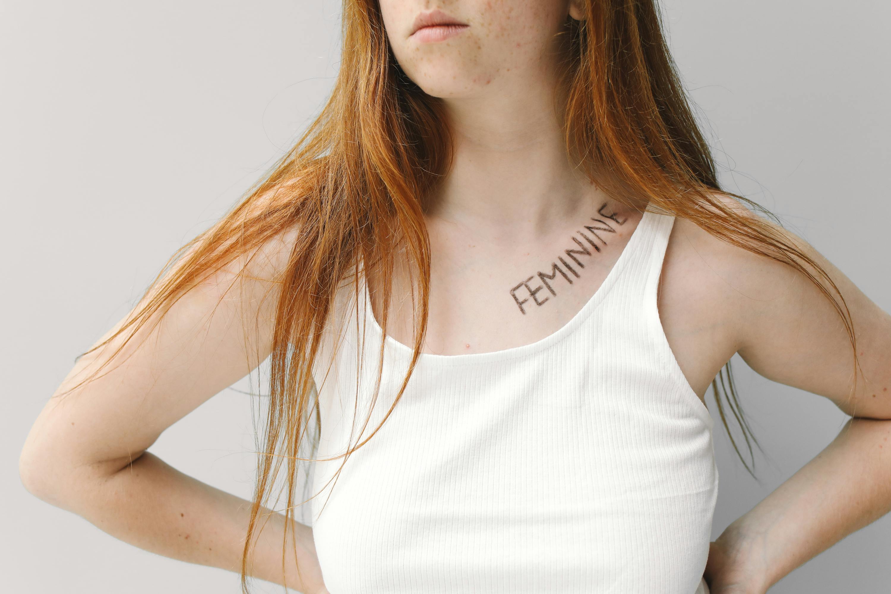 Woman in White Tank Top · Free Stock Photo