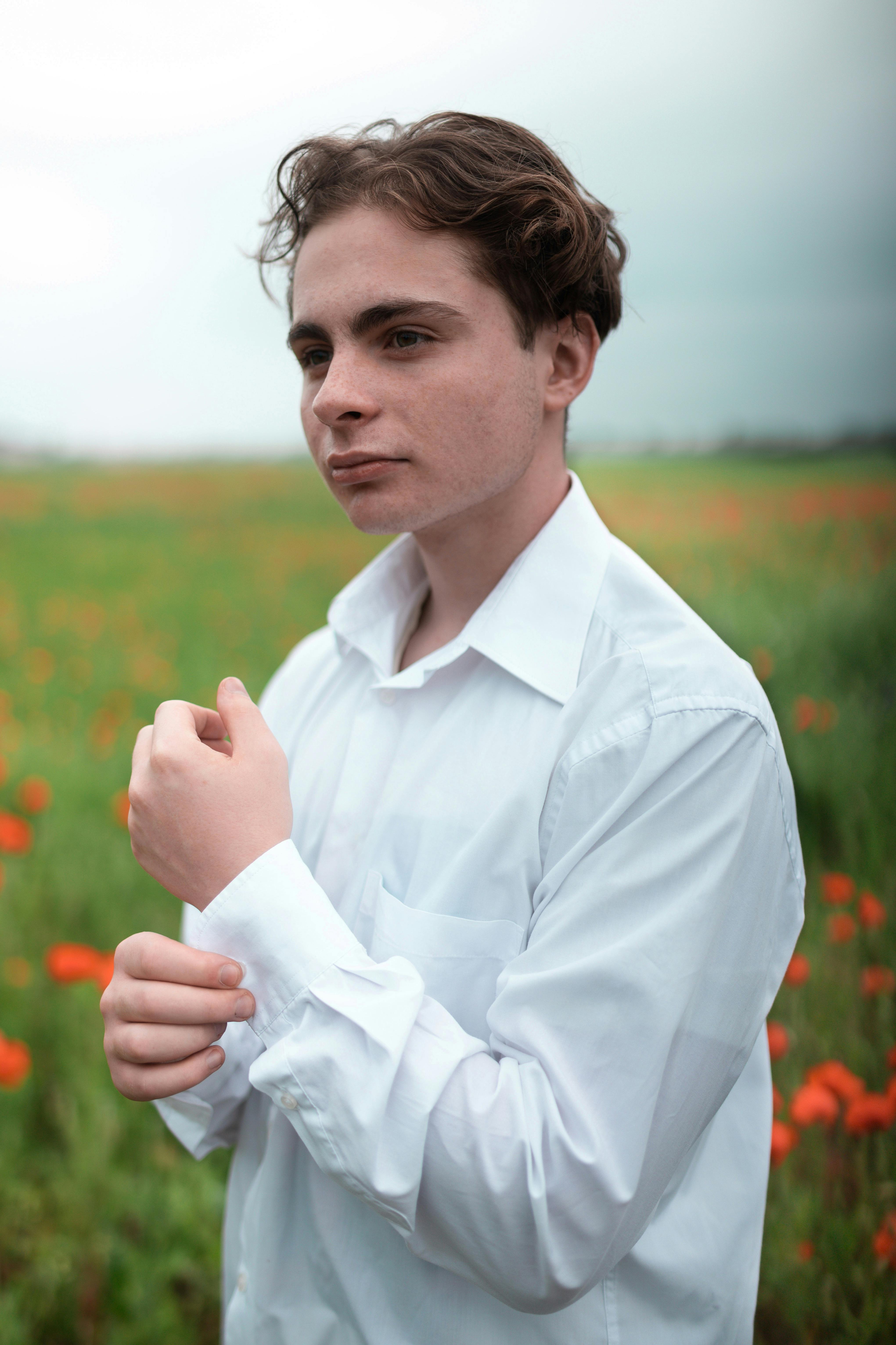 Portrait Shot of a Boy Wearing Blue Shirt · Free Stock Photo