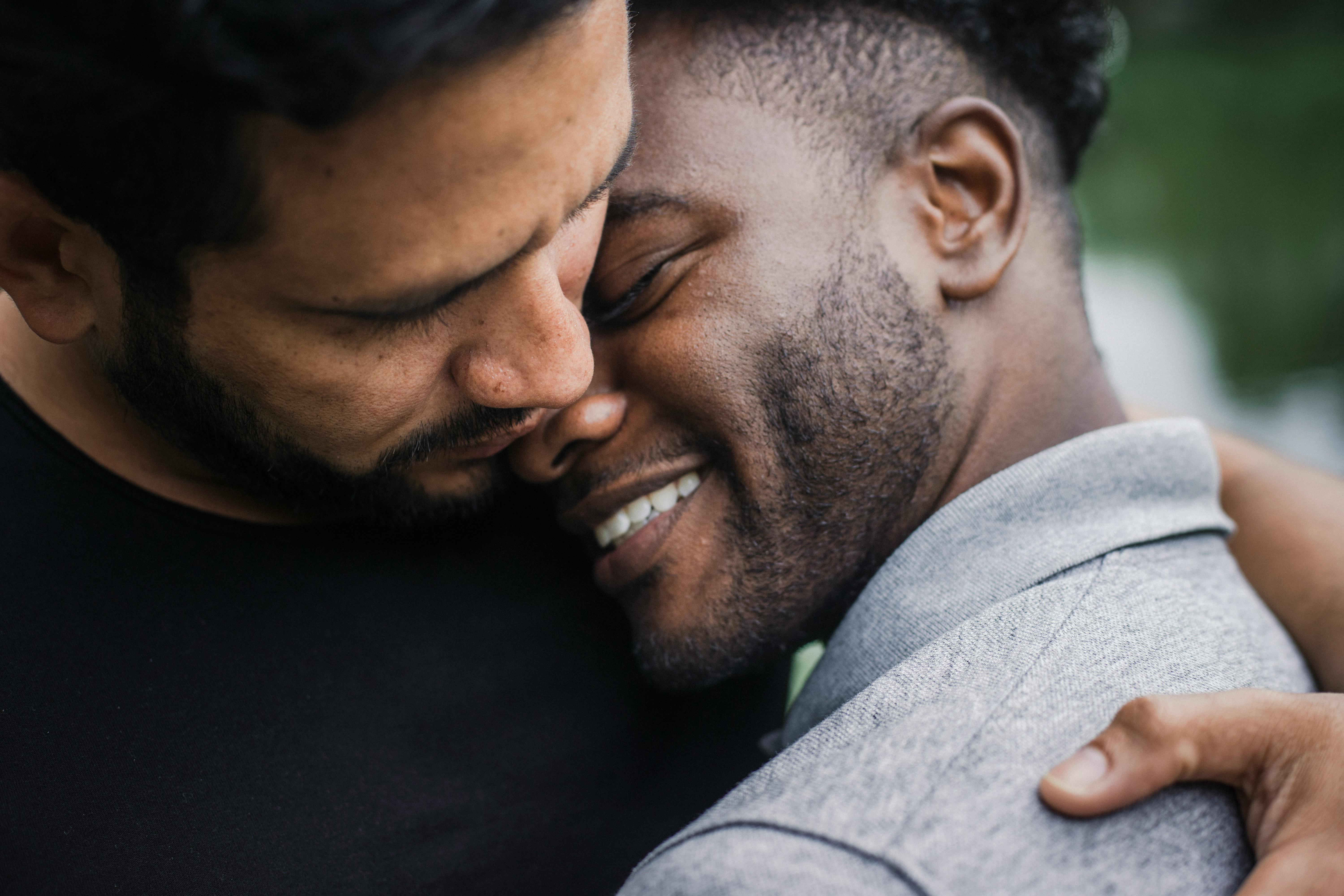 Men Hugging and Smiling · Free Stock Photo