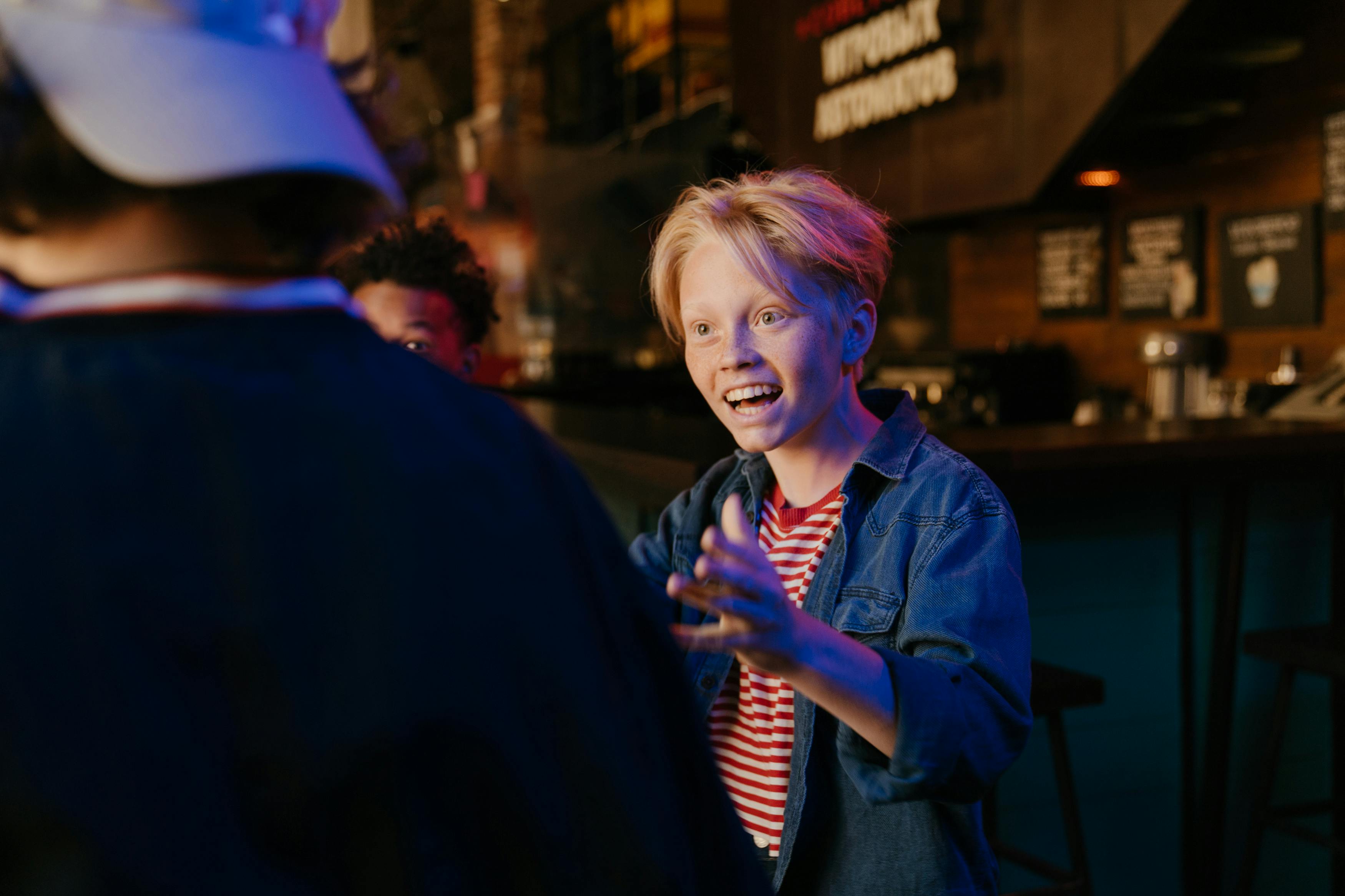 Woman in Blue Jacket Smiling · Free Stock Photo