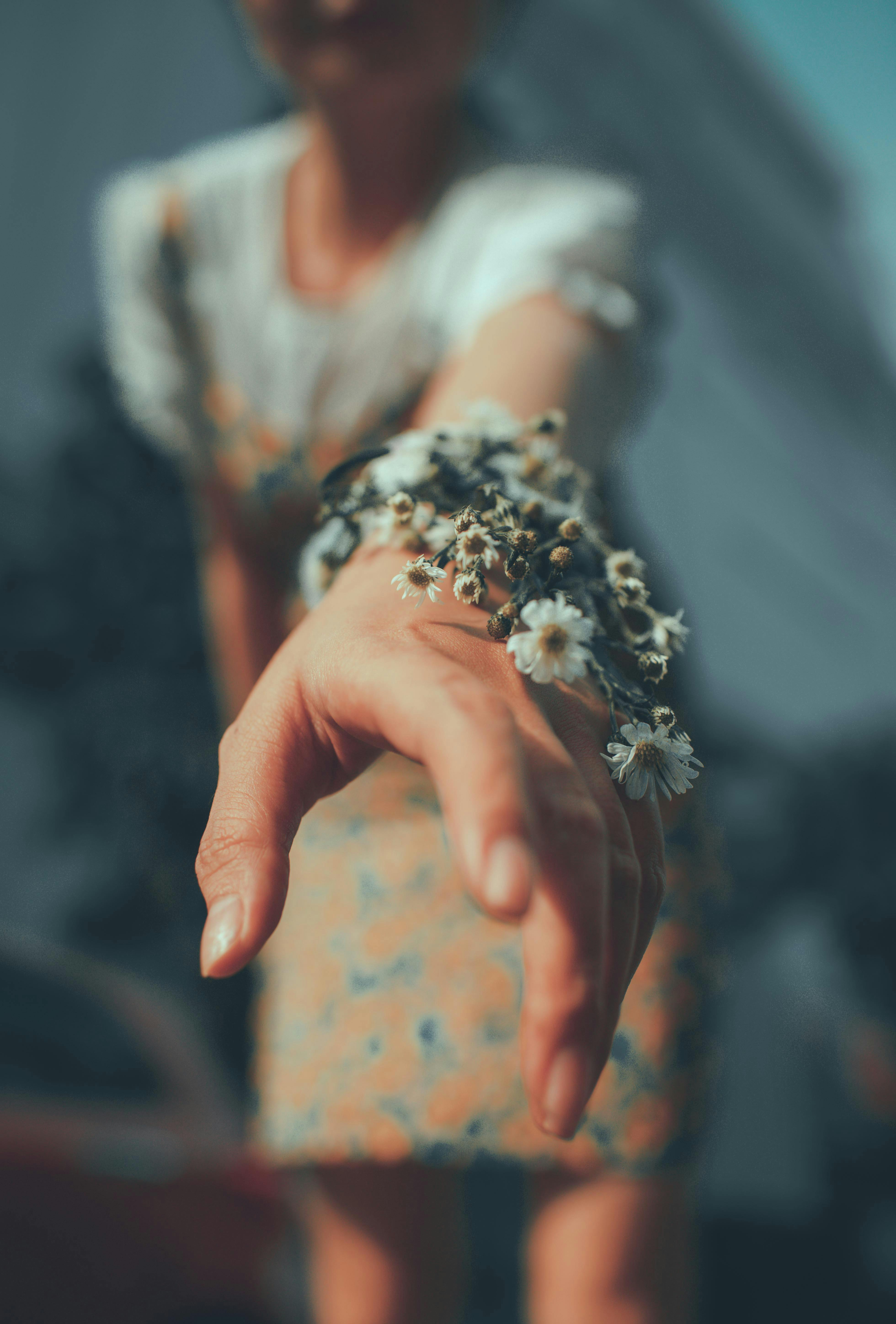 Woman Trying to Cover the Camera with Her Hand · Free Stock Photo