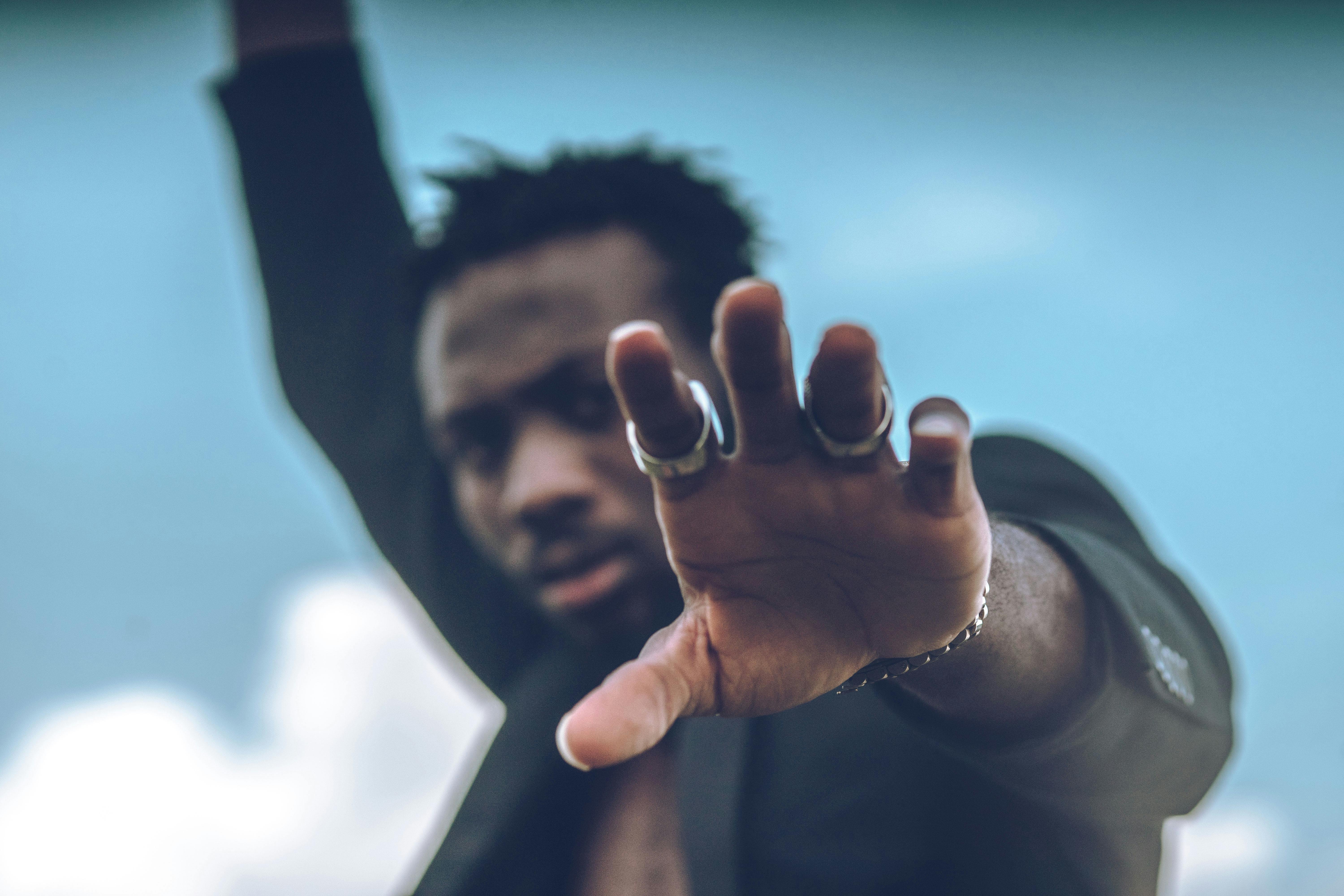 Photo Of A Person Reaching Out His Hand · Free Stock Photo