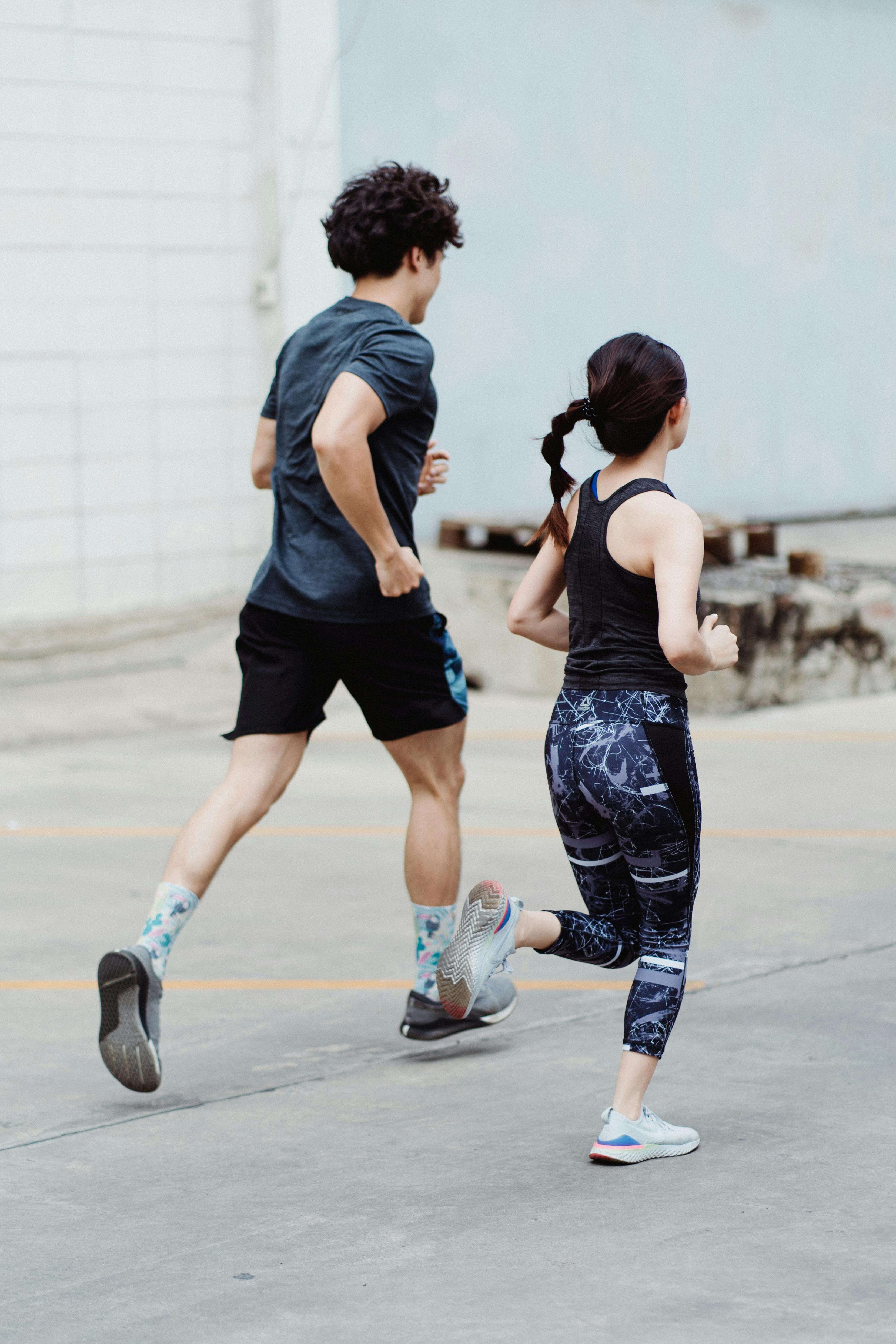A Couple Jogging Together · Free Stock Photo