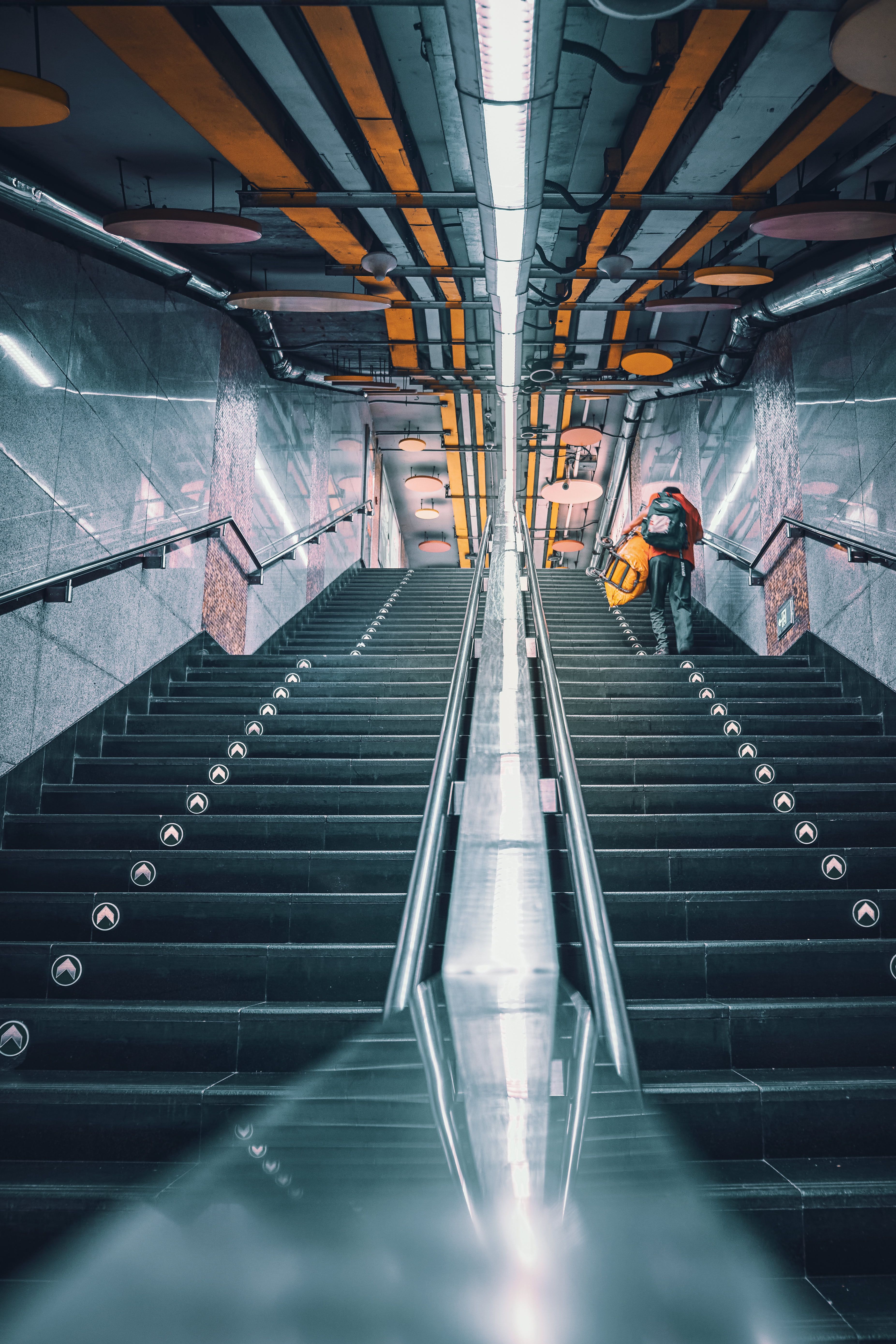 Man Walking Up using Staircase · Free Stock Photo
