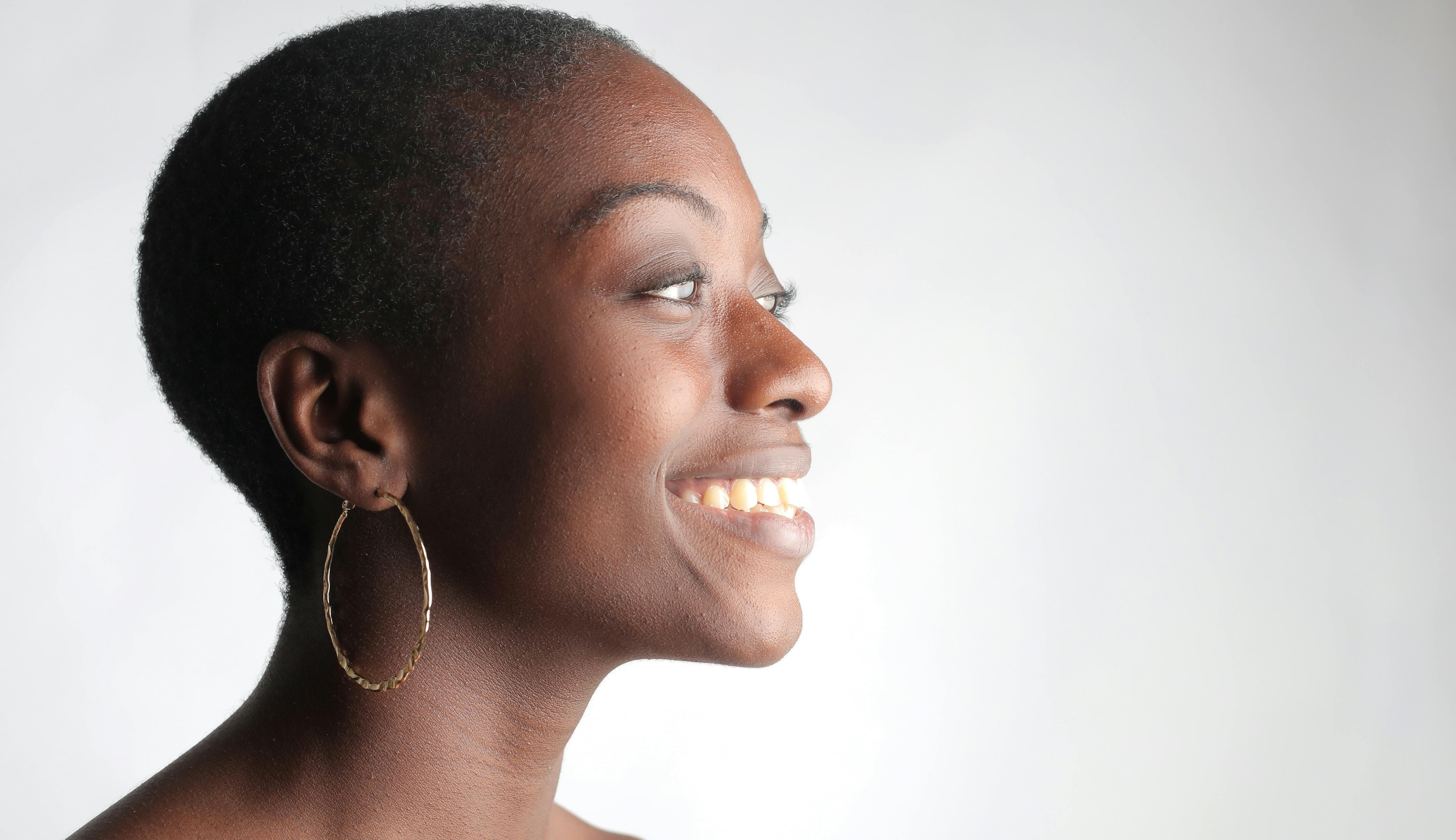 Side Profile of Woman in Swimwear Smiling · Free Stock Photo