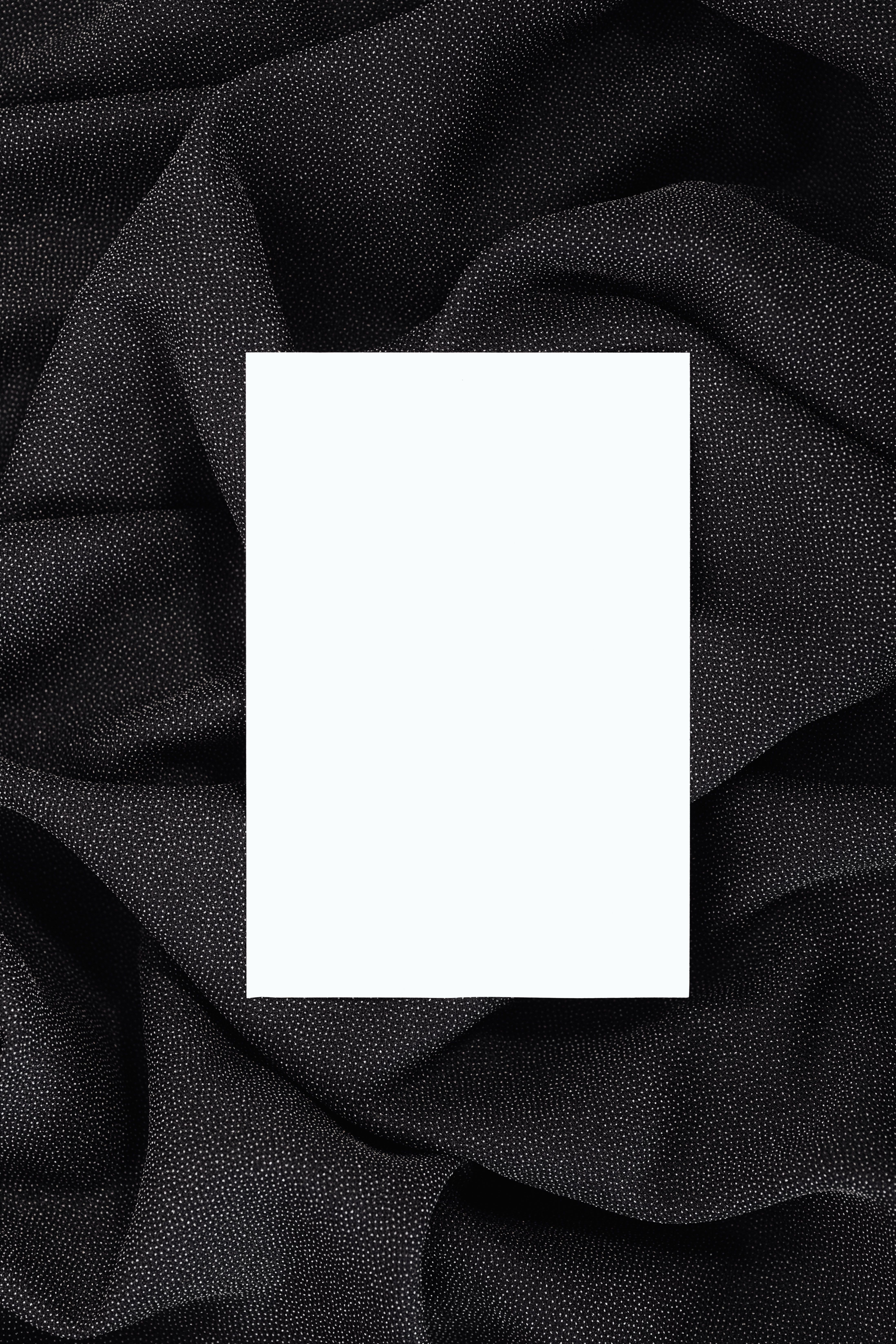 Black Paper on Top of a Black Fabric · Free Stock Photo