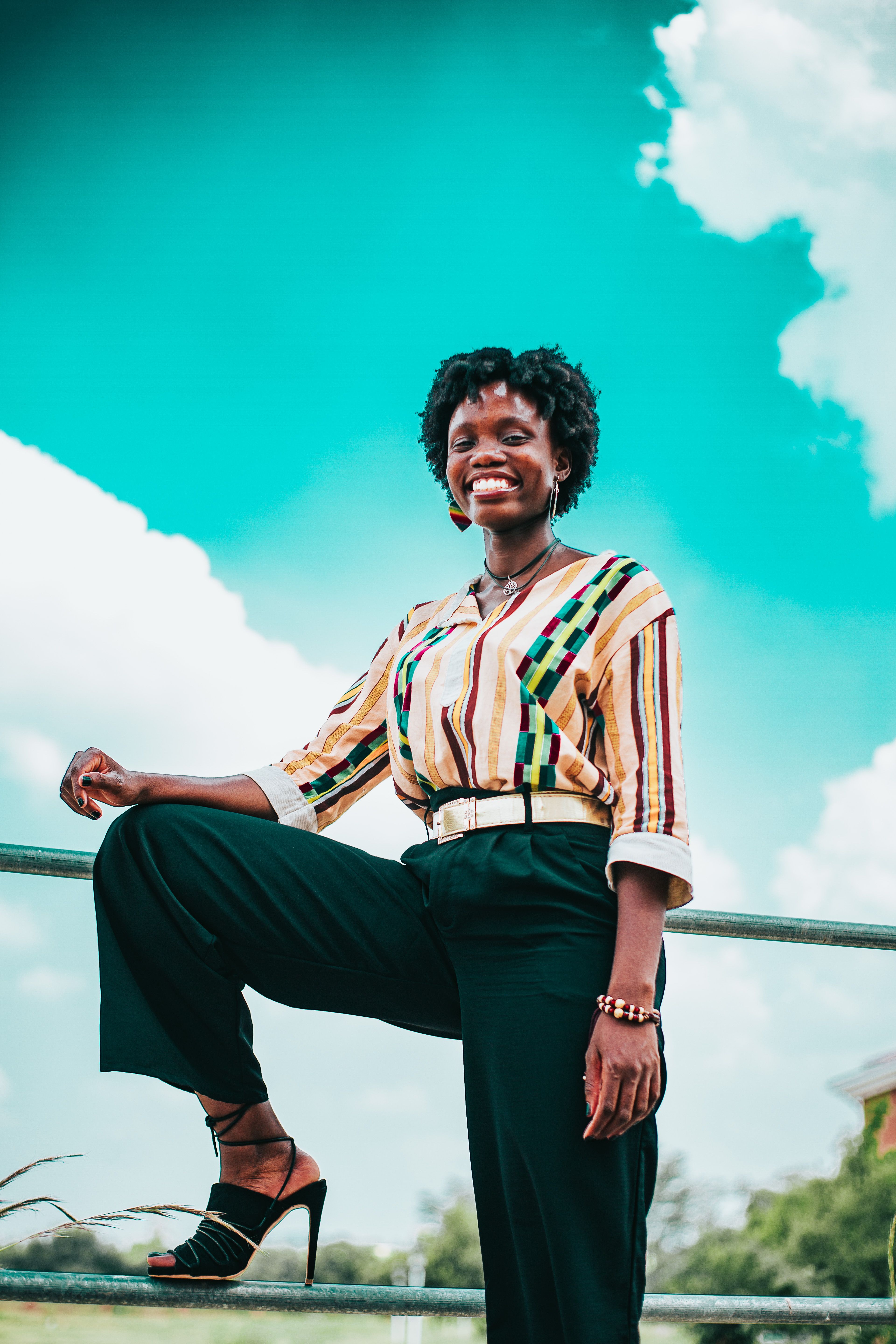 Woman Posing Sitting on Steps · Free Stock Photo