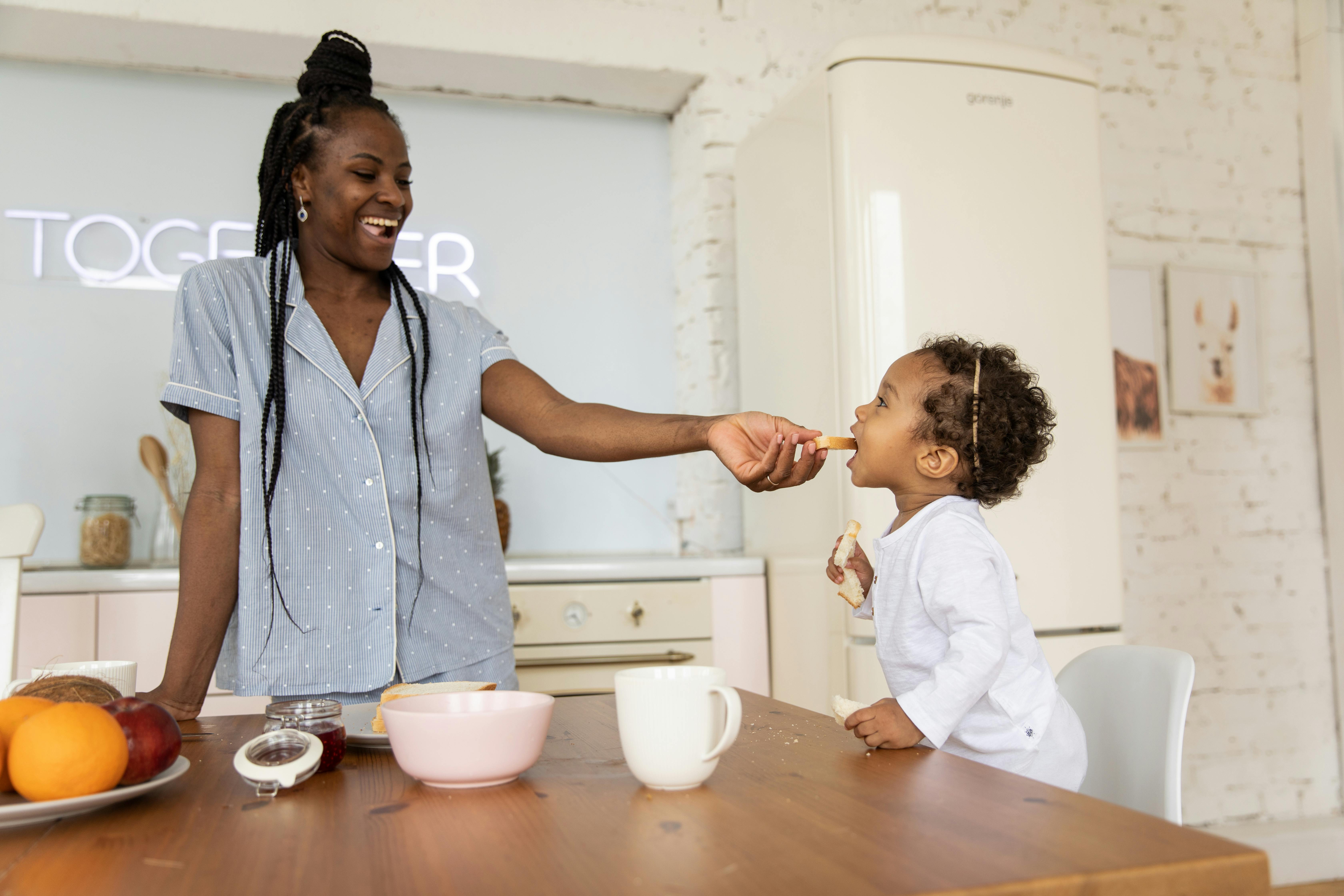 Family Making Breakfast in the Kitchen · Free Stock Photo