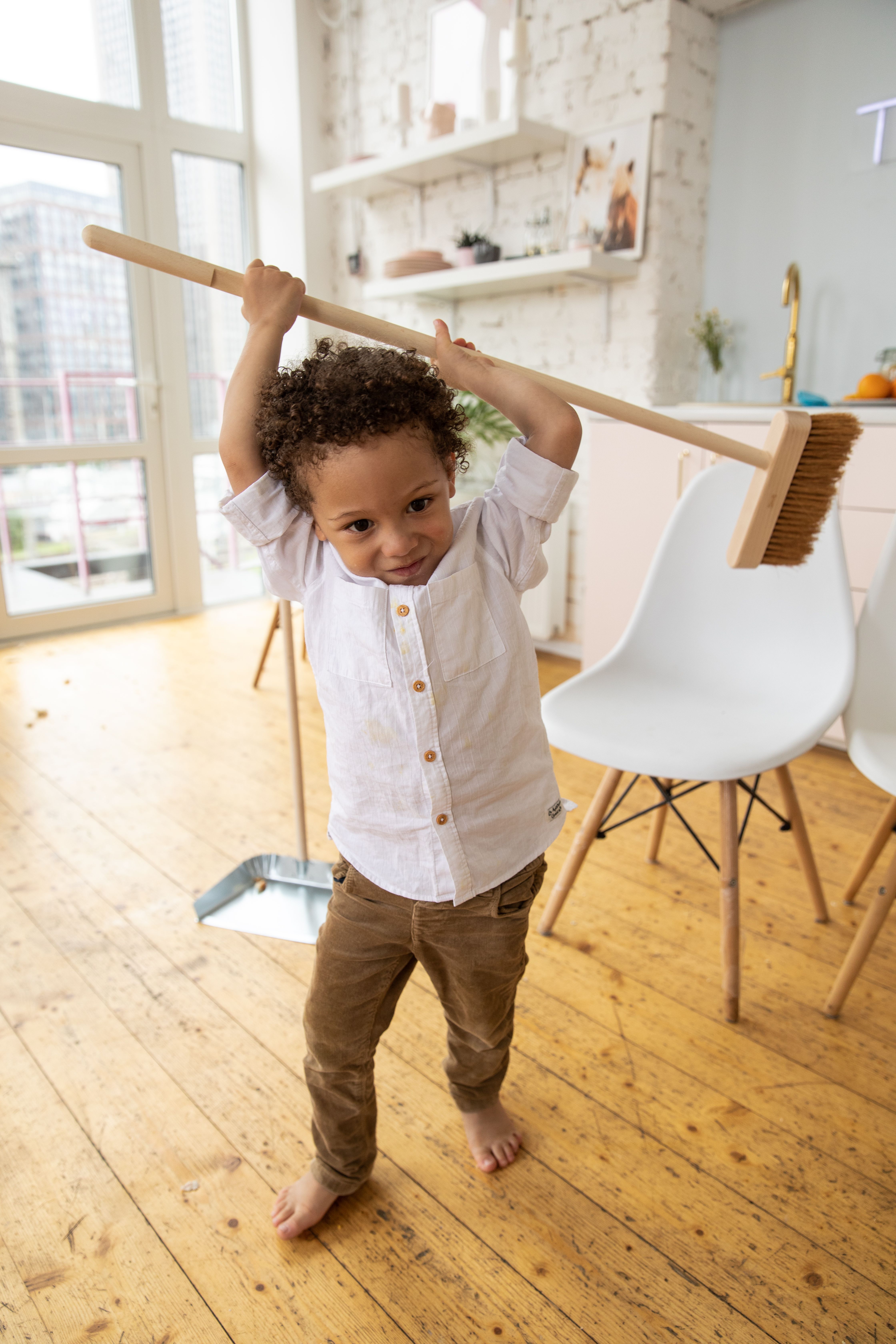 Child with Broom · Free Stock Photo