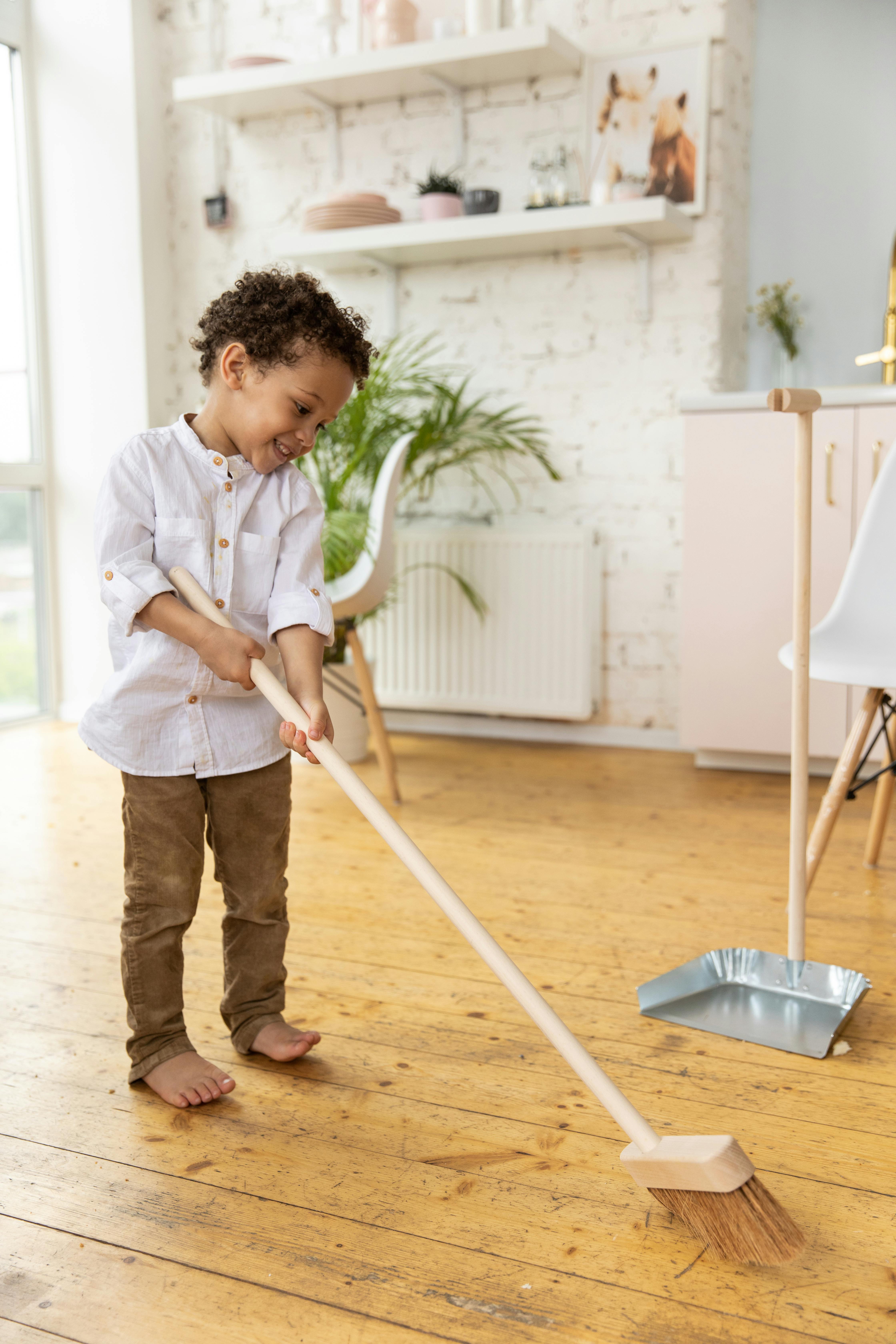 Child with Broom · Free Stock Photo