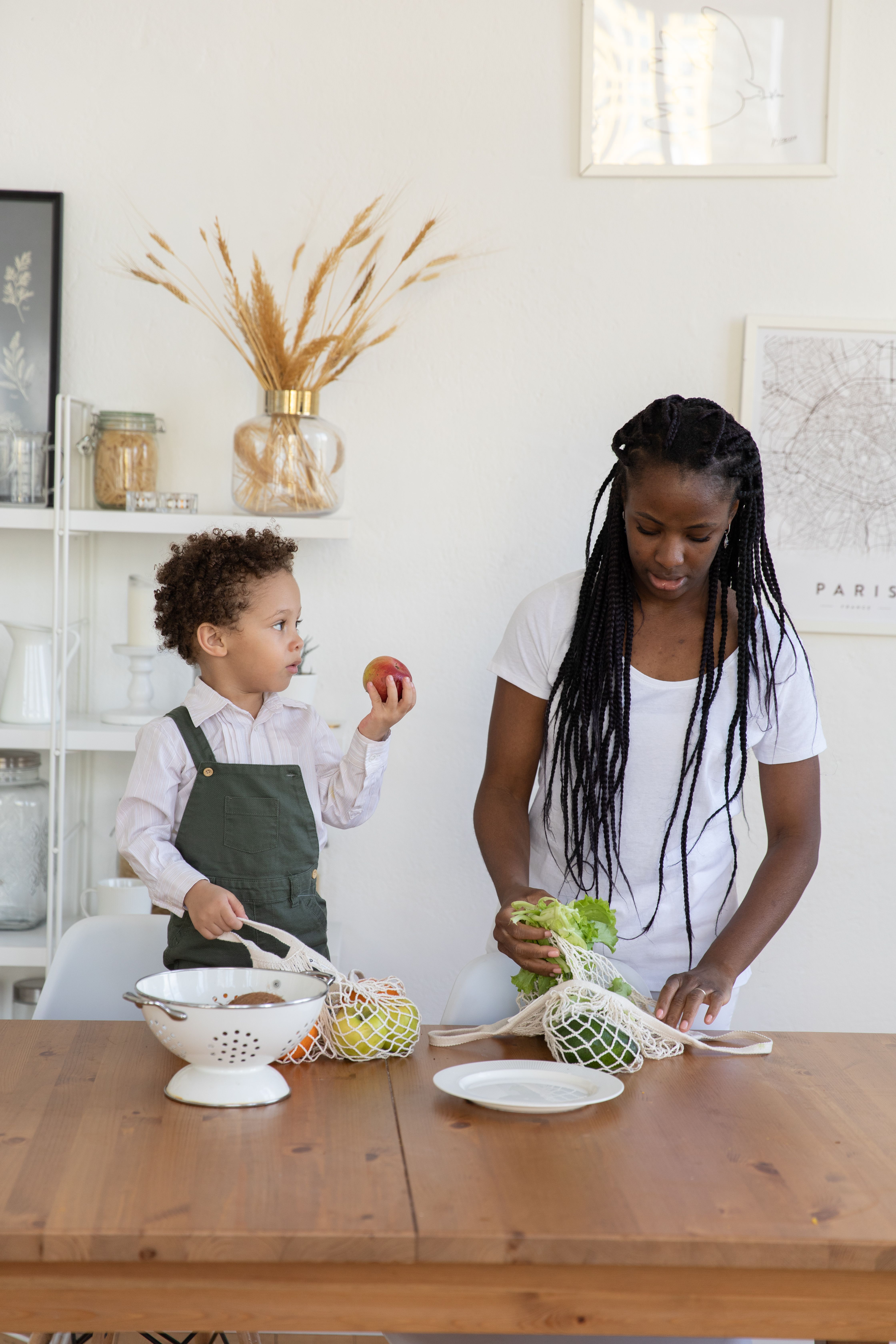 Mother and Child Holding Apple · Free Stock Photo