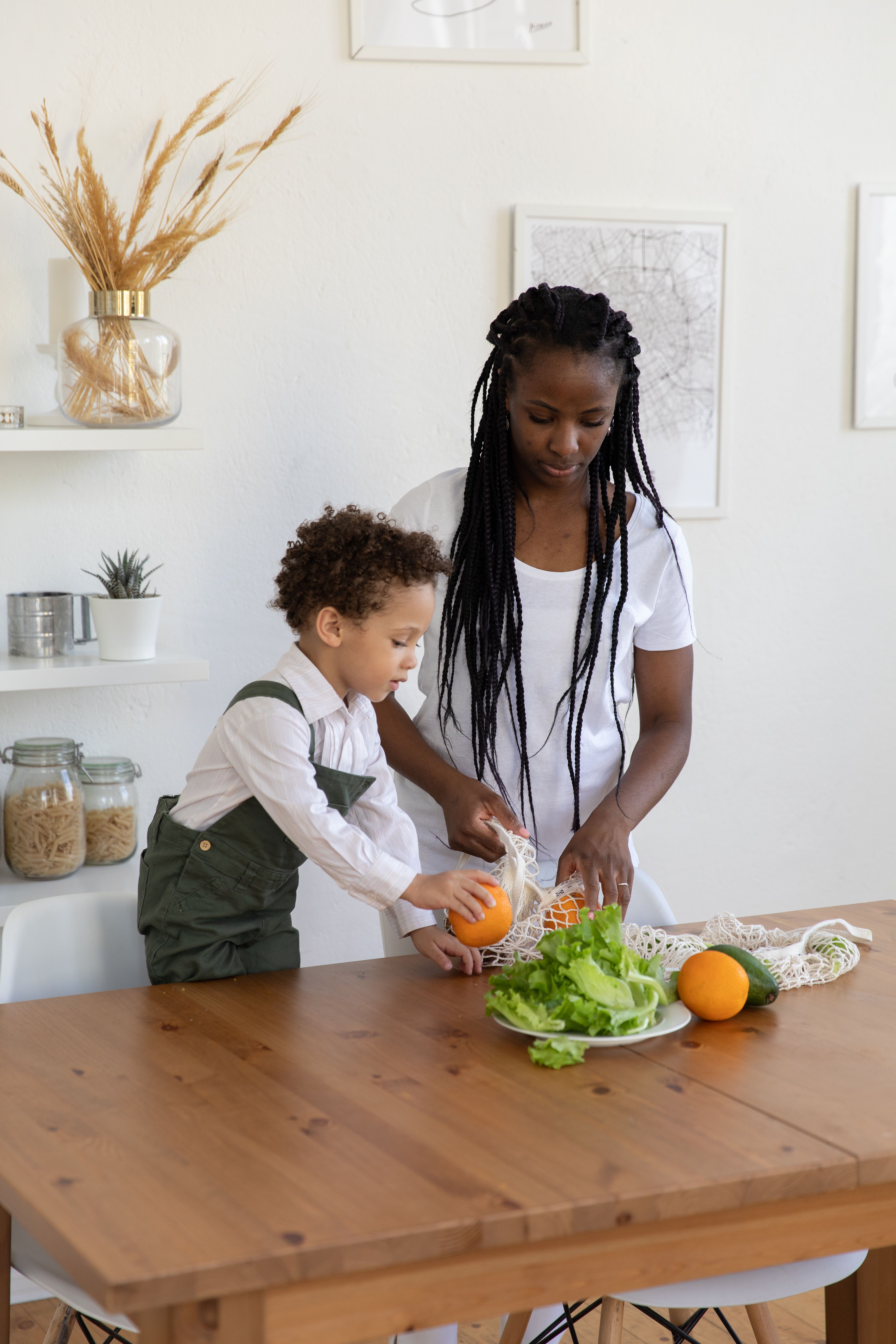 Mother and Child Holding Apple · Free Stock Photo