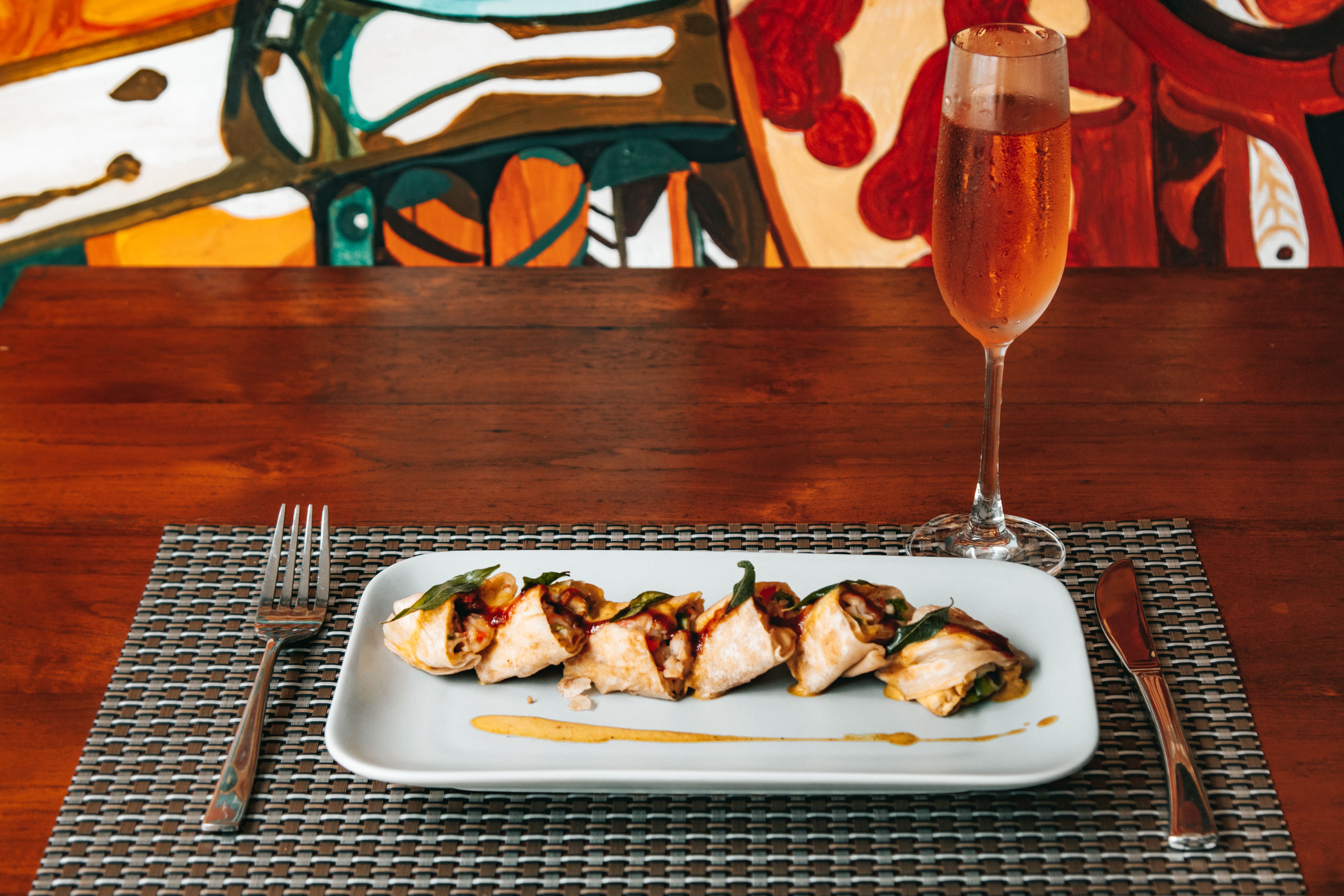 An Alcoholic Beverage and Food on a Serving Plate · Free Stock Photo