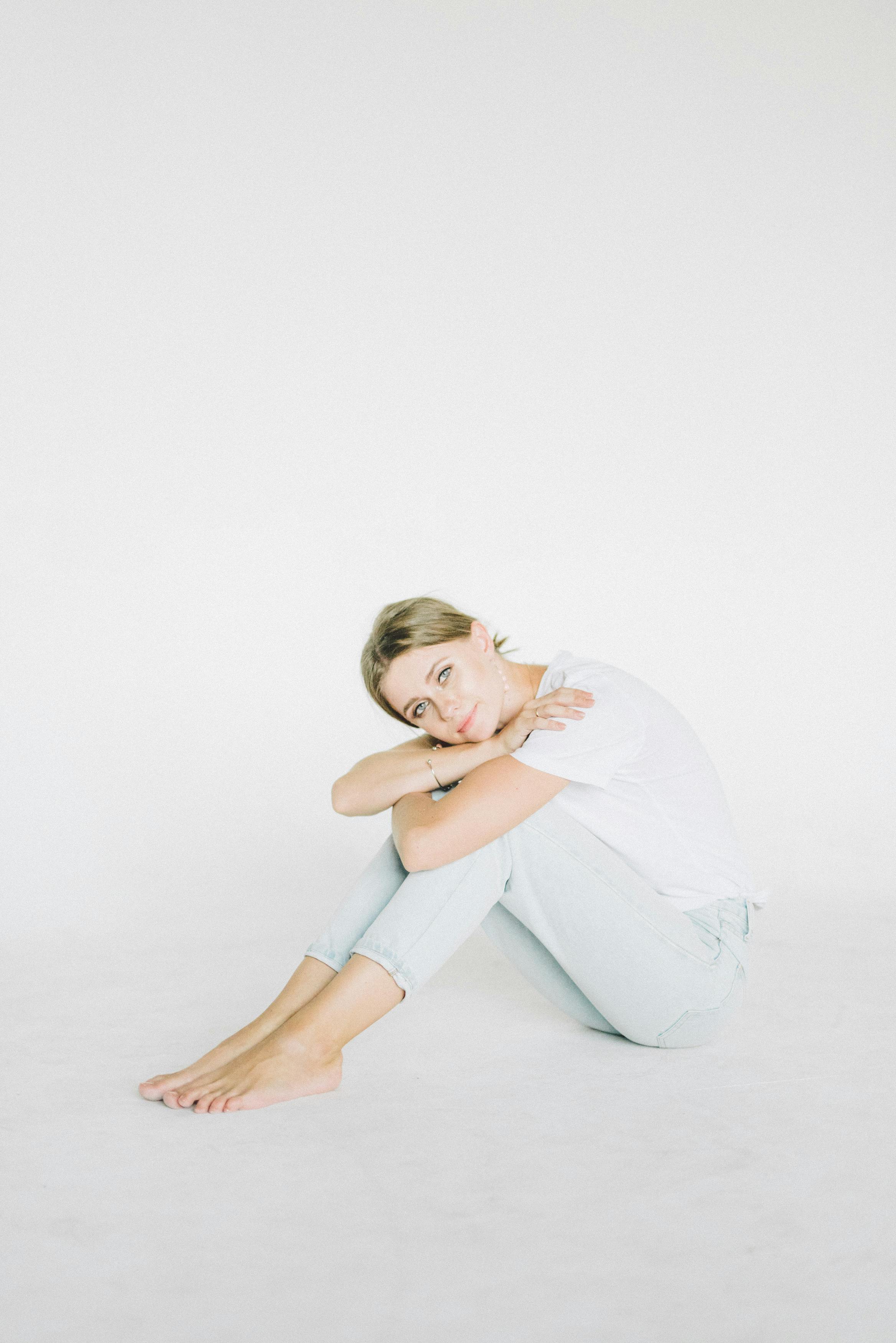 Woman Sitting across the Armchair · Free Stock Photo