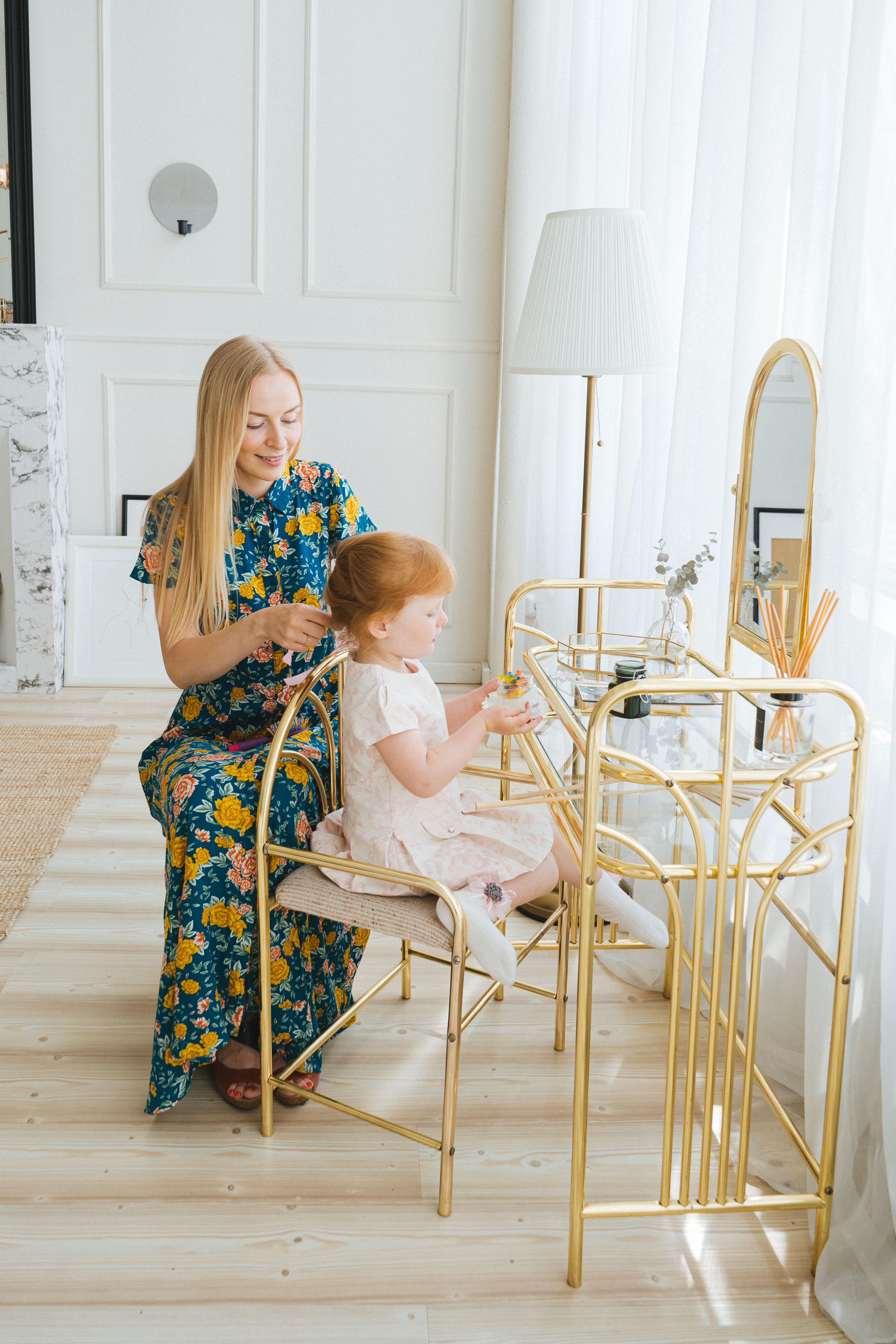 Photo of a Woman in a Floral Dress Fixing Her Daughter's Hair · Free ...