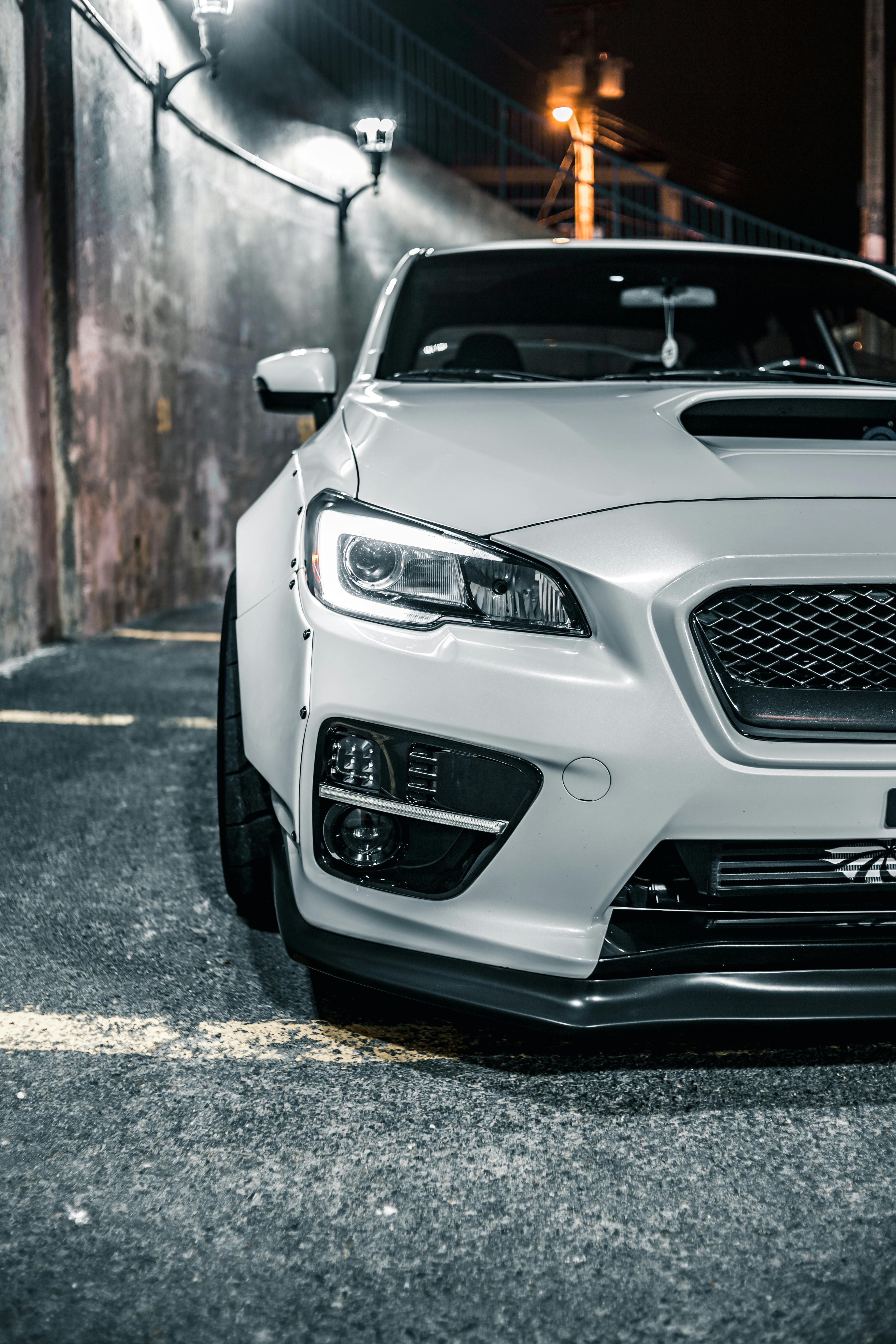 White modern car on parking lot · Free Stock Photo