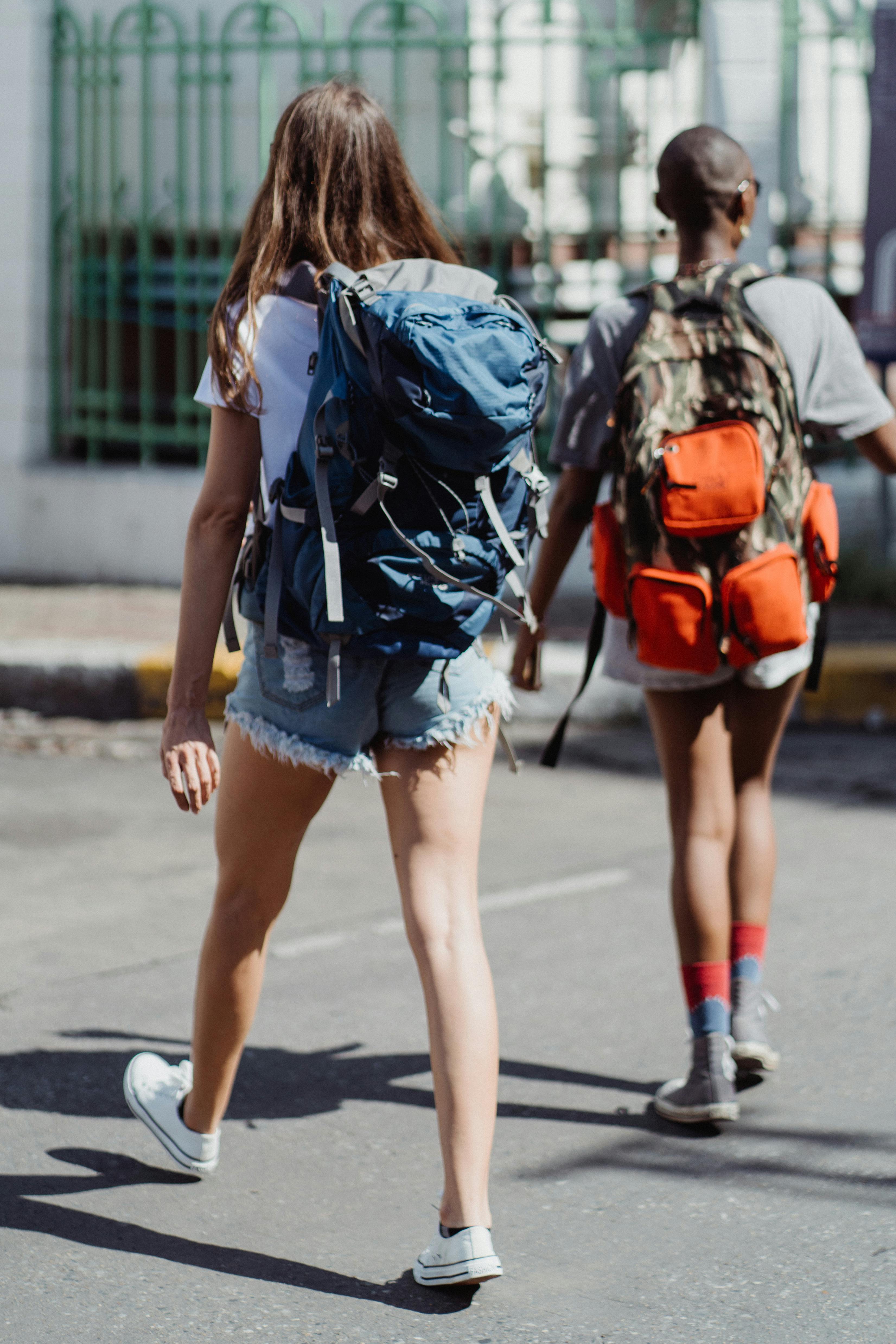 Women Walking with Backpacks · Free Stock Photo