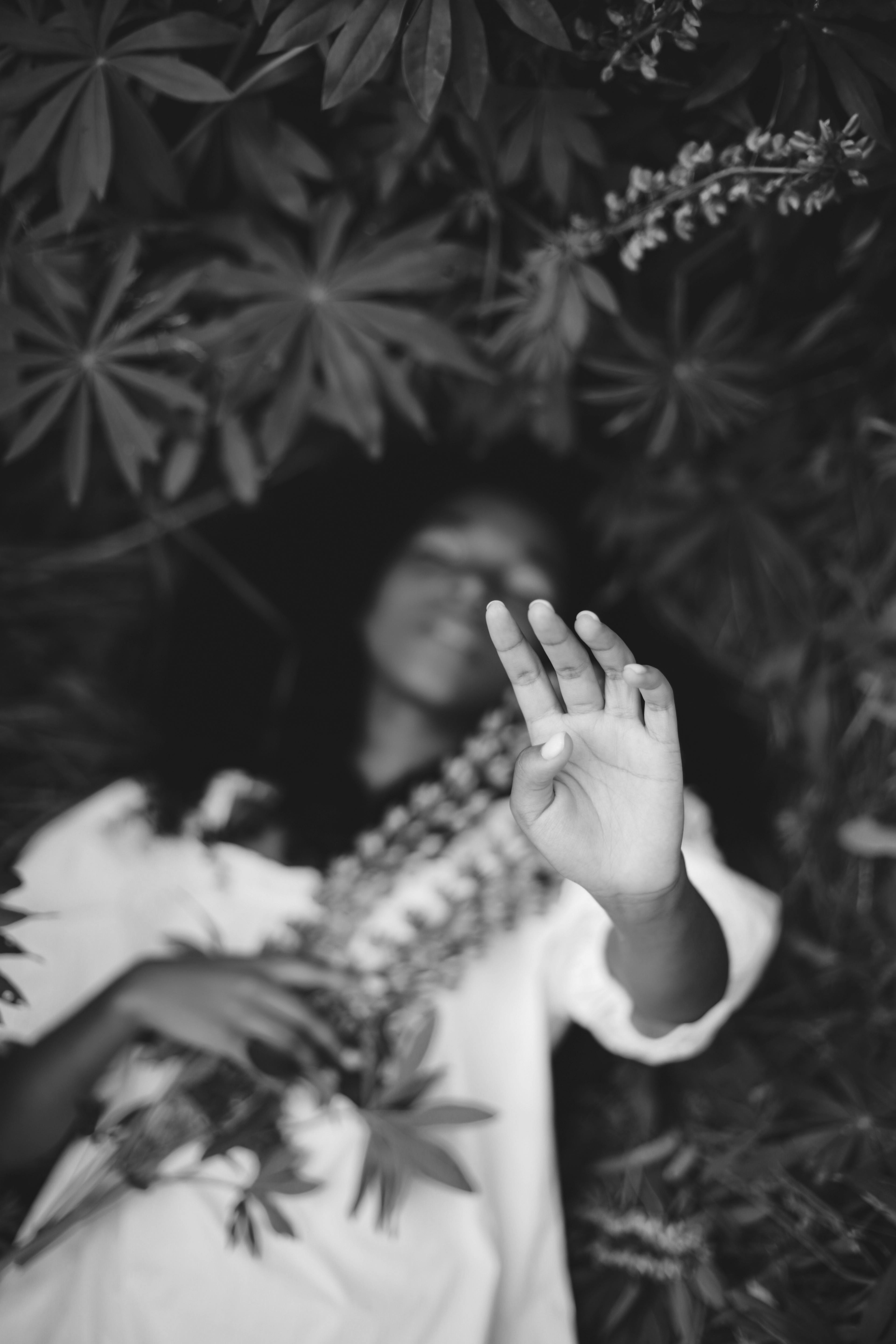 Grayscale Photo of Persons Hand · Free Stock Photo