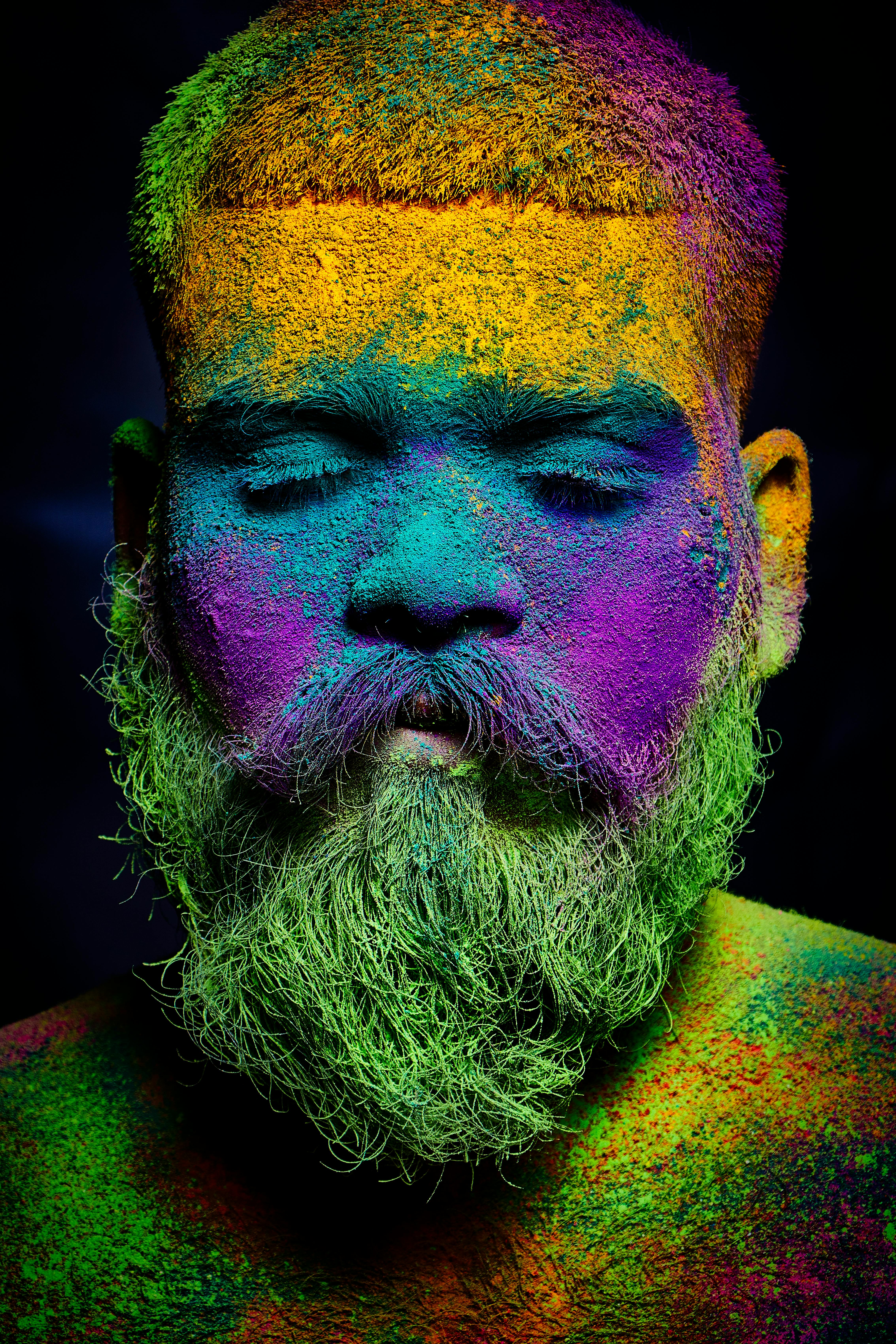 Close-up of a Man Covered with Colored Powder · Free Stock Photo