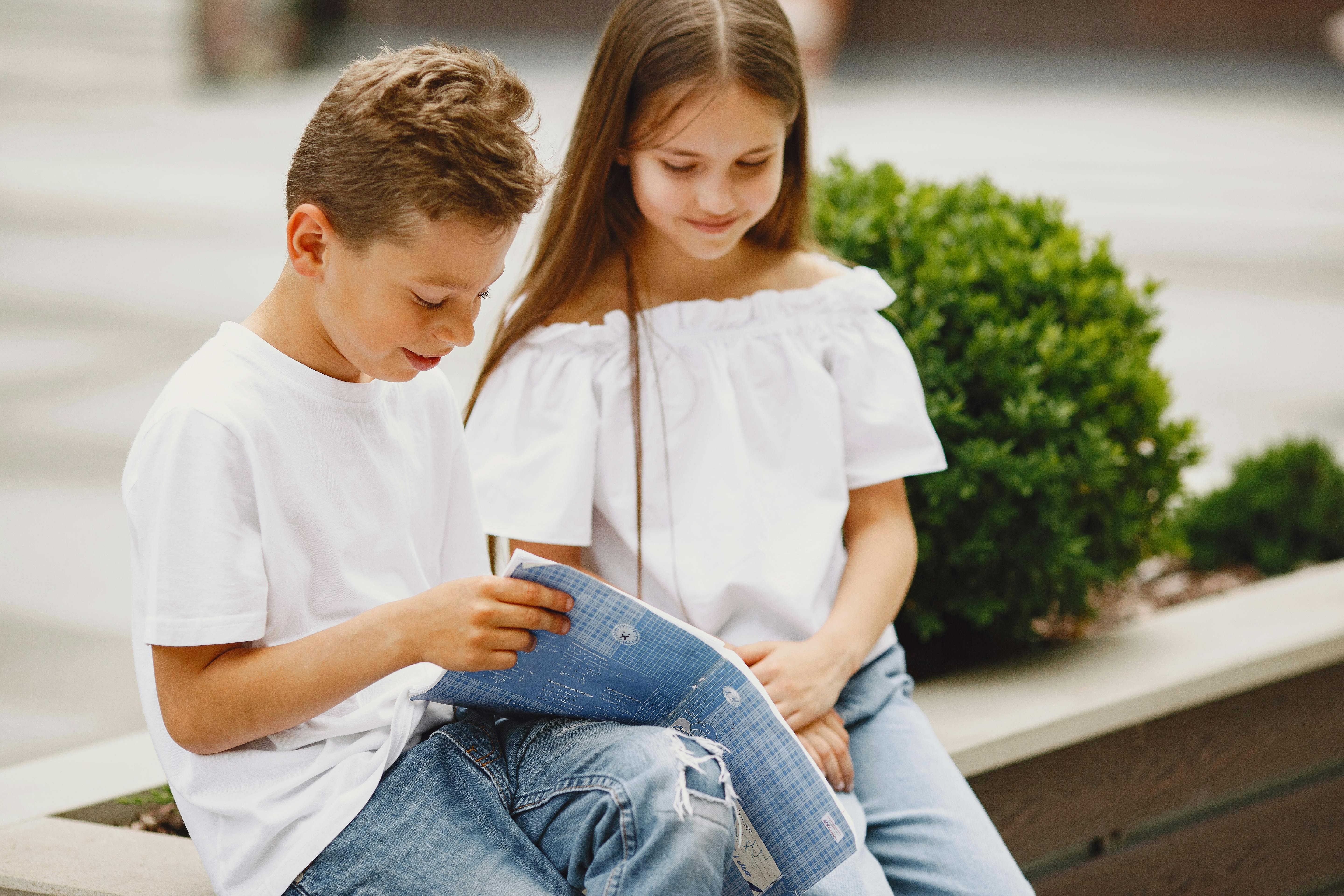 Children Sitting and Reading · Free Stock Photo