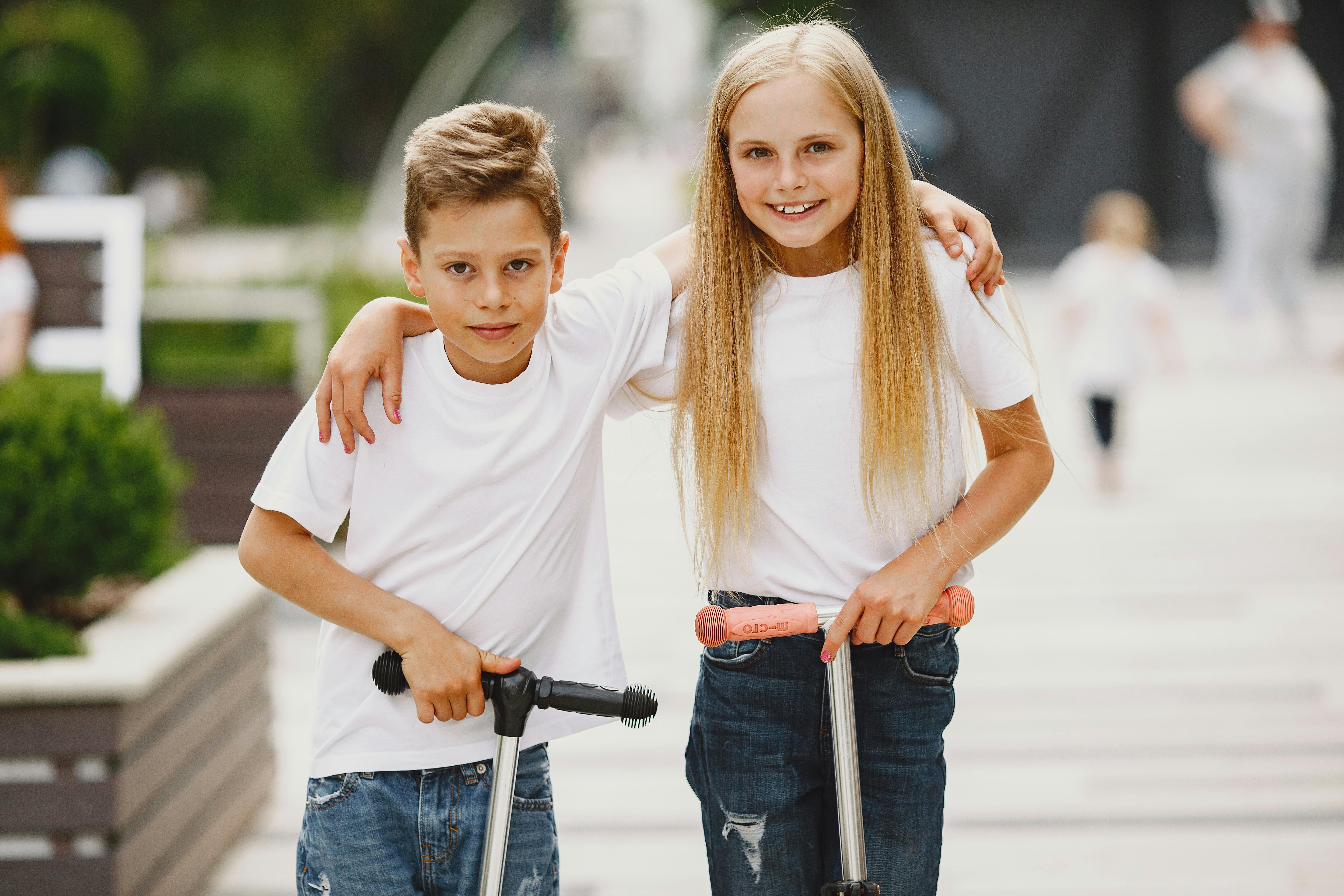 Children Riding Scooters in Par · Free Stock Photo