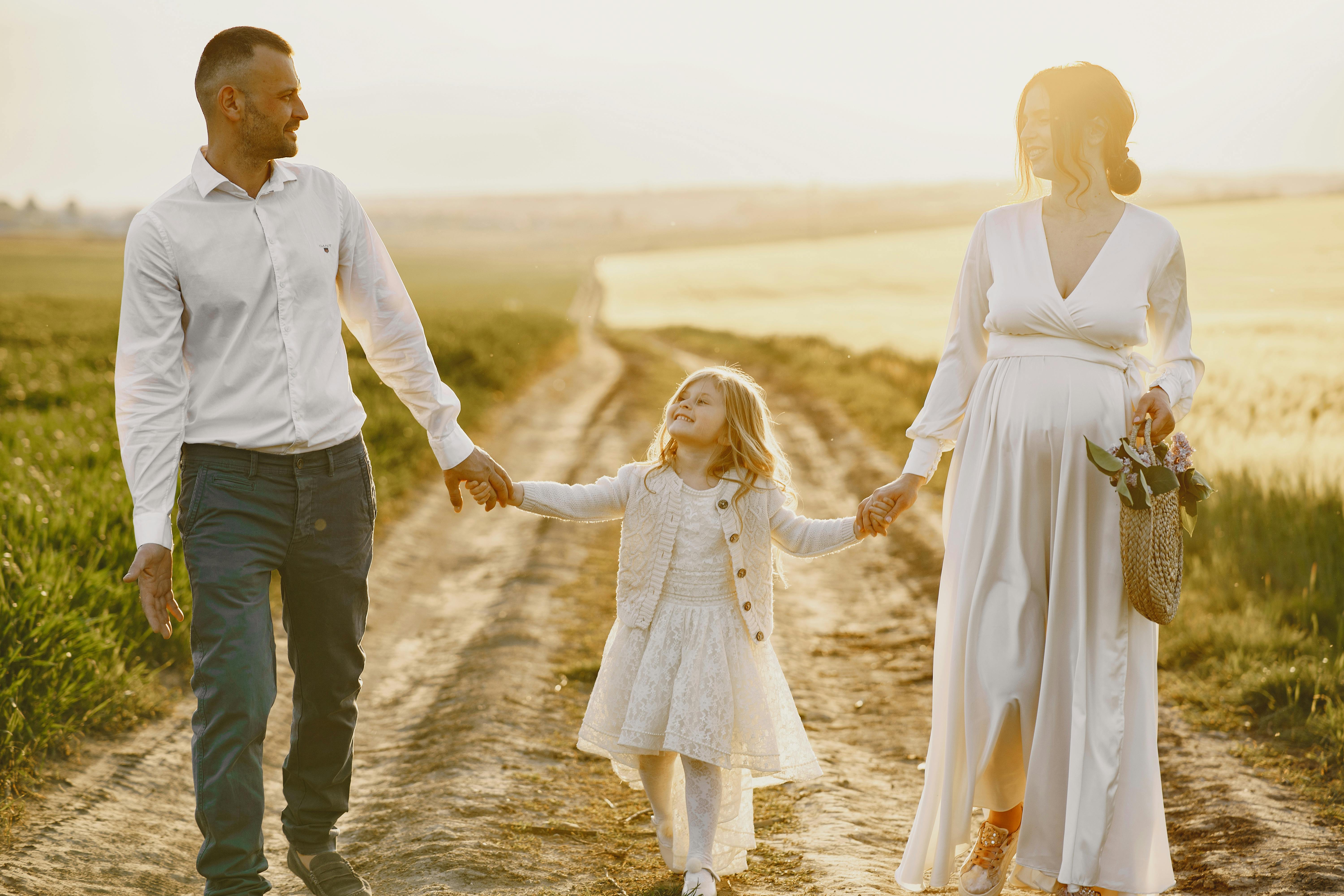 Family Portrait in a Rural Scenery · Free Stock Photo