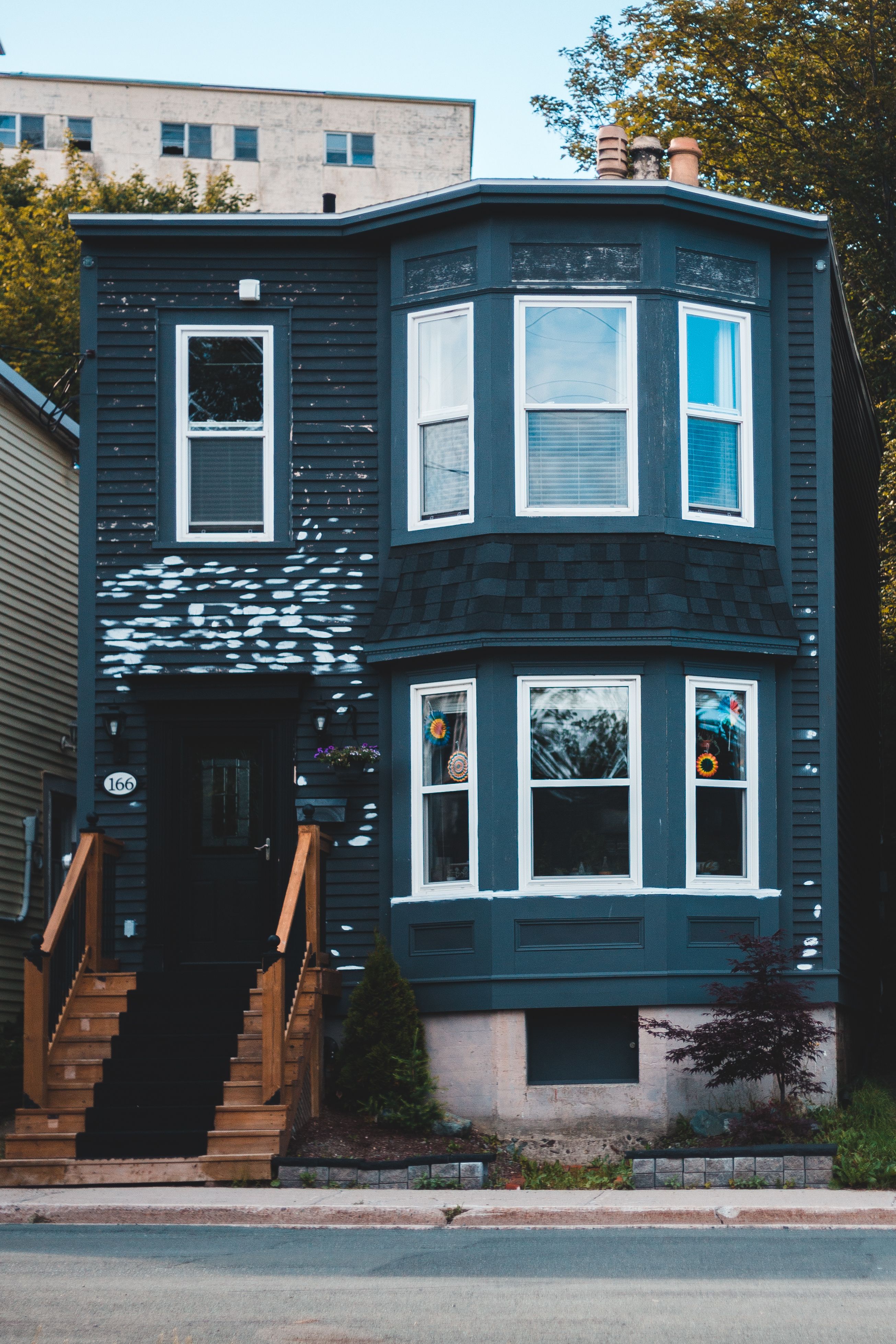 House with wooden stairs on street · Free Stock Photo