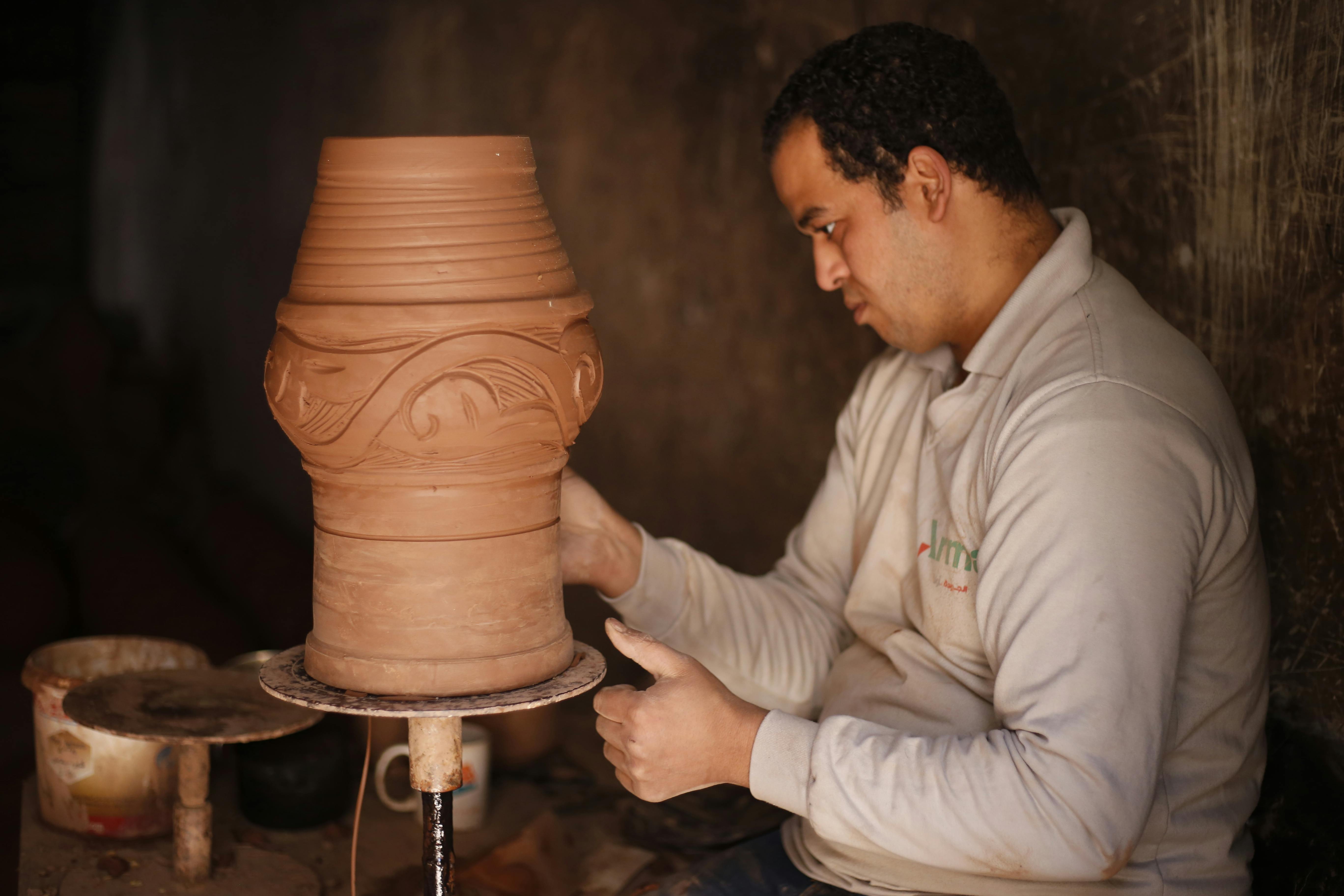 Woman Making Clay Pot · Free Stock Photo