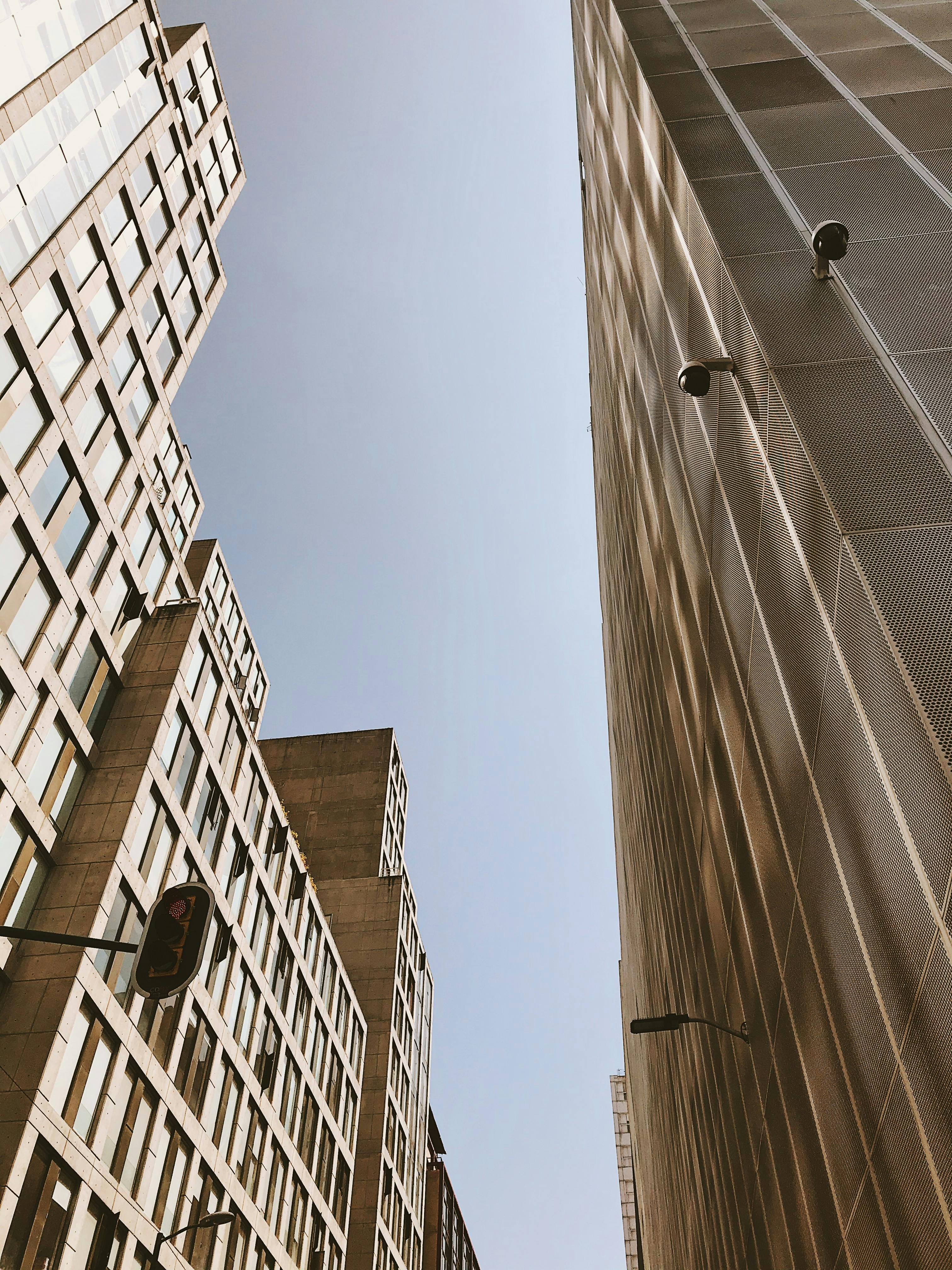 Grey Concrete Round High Rise Building · Free Stock Photo