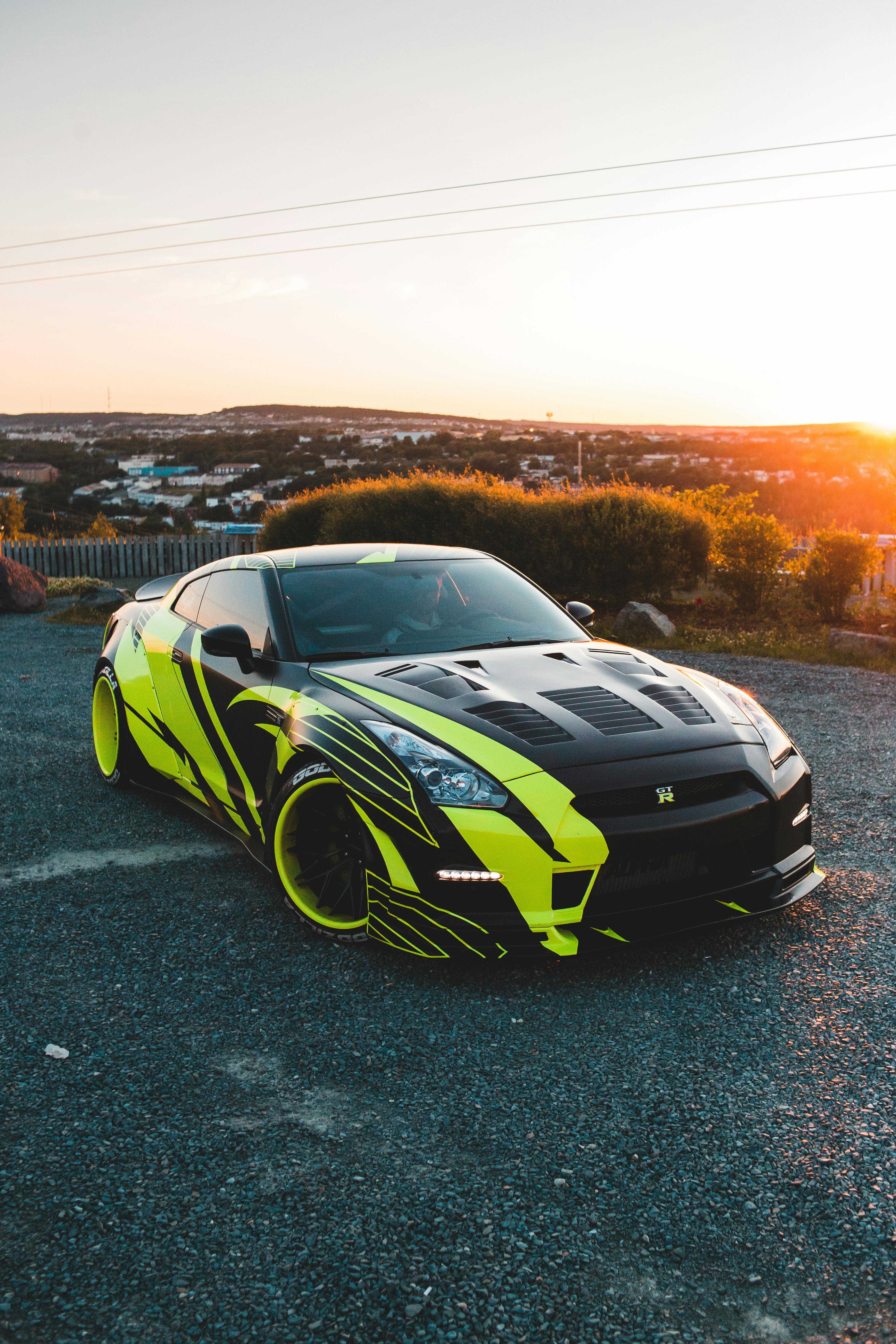 Luxury sport car with bright stripes · Free Stock Photo