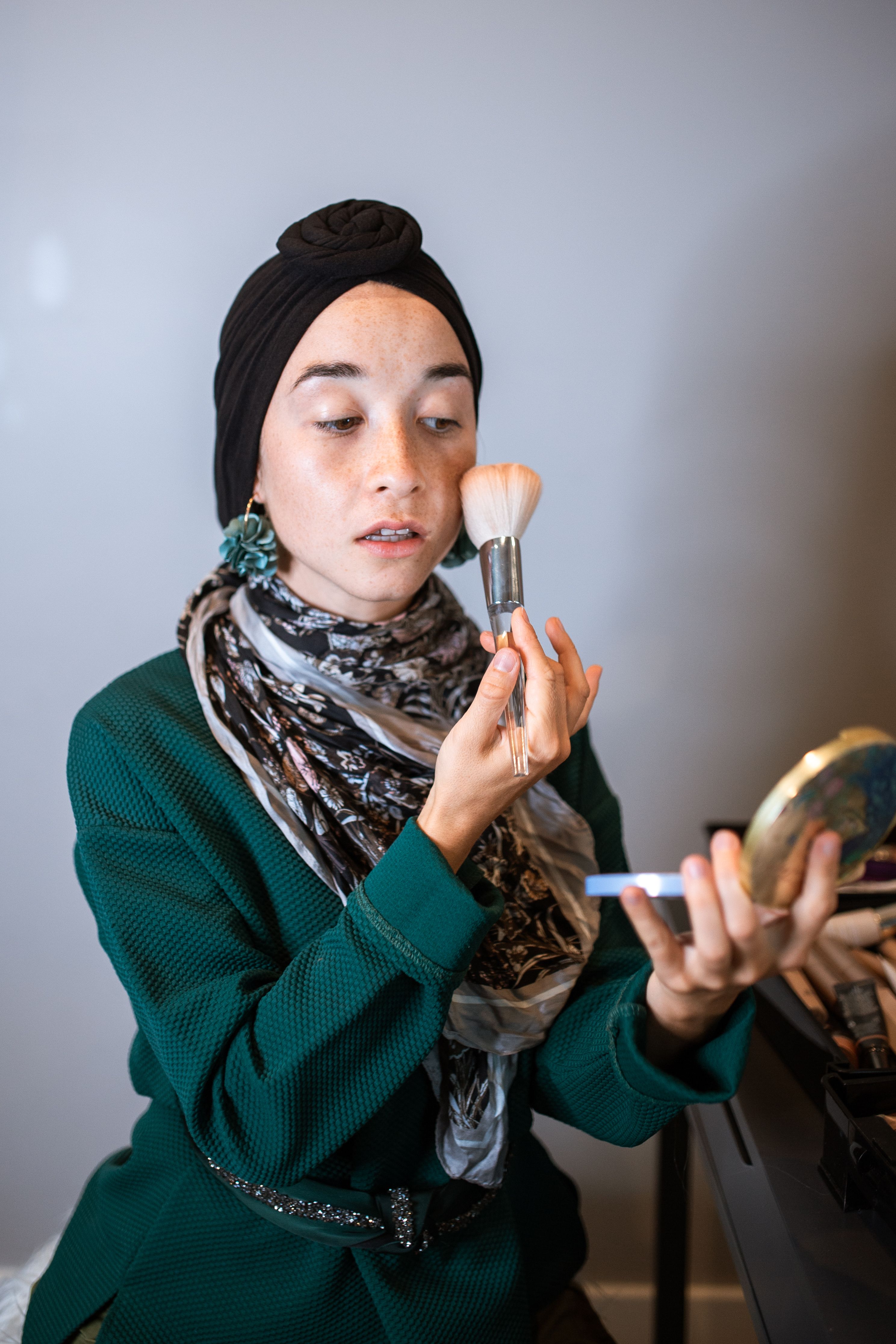 A Man Applying Makeup on a Woman's Face · Free Stock Photo