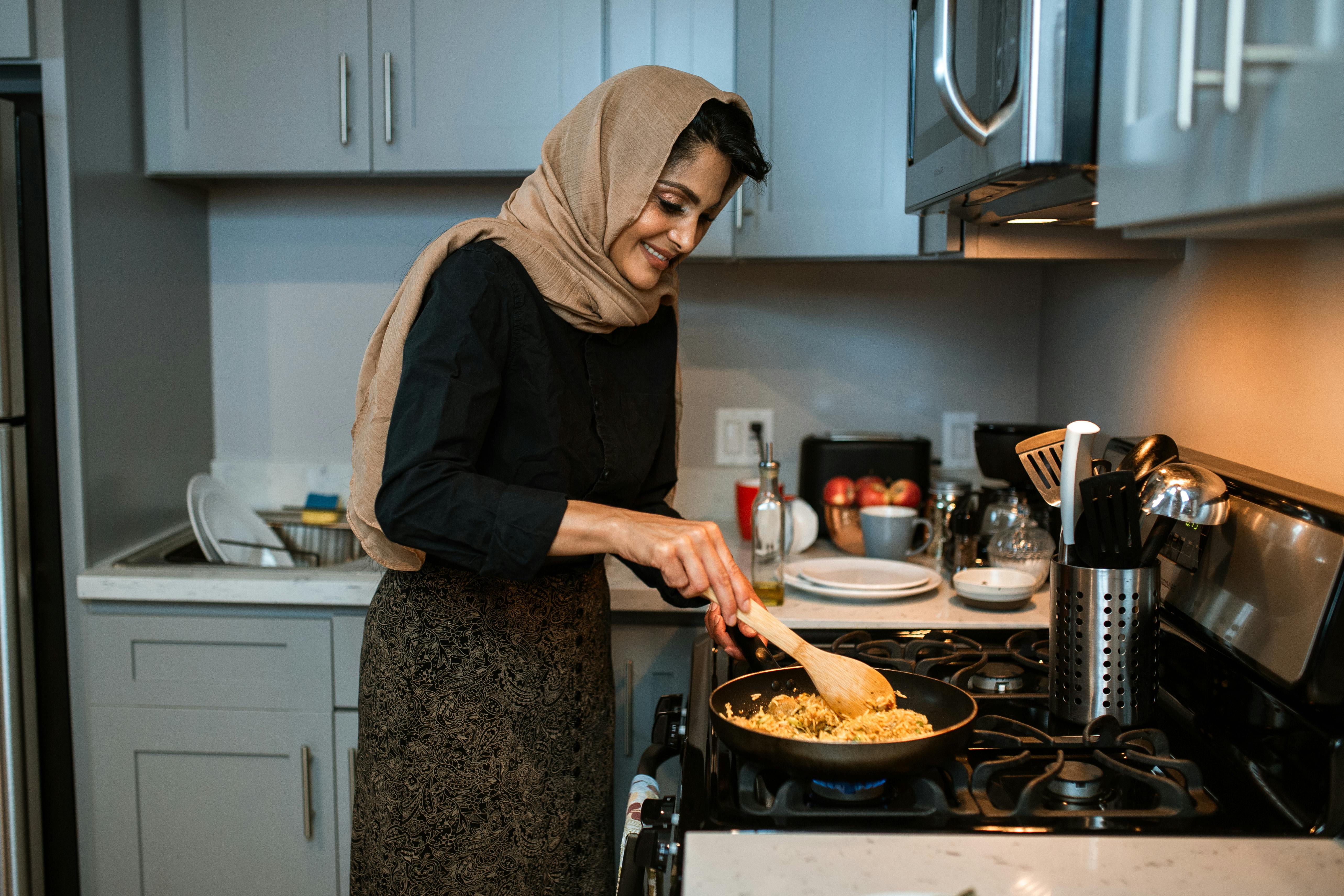 A Woman Cooking Fried Rice · Free Stock Photo