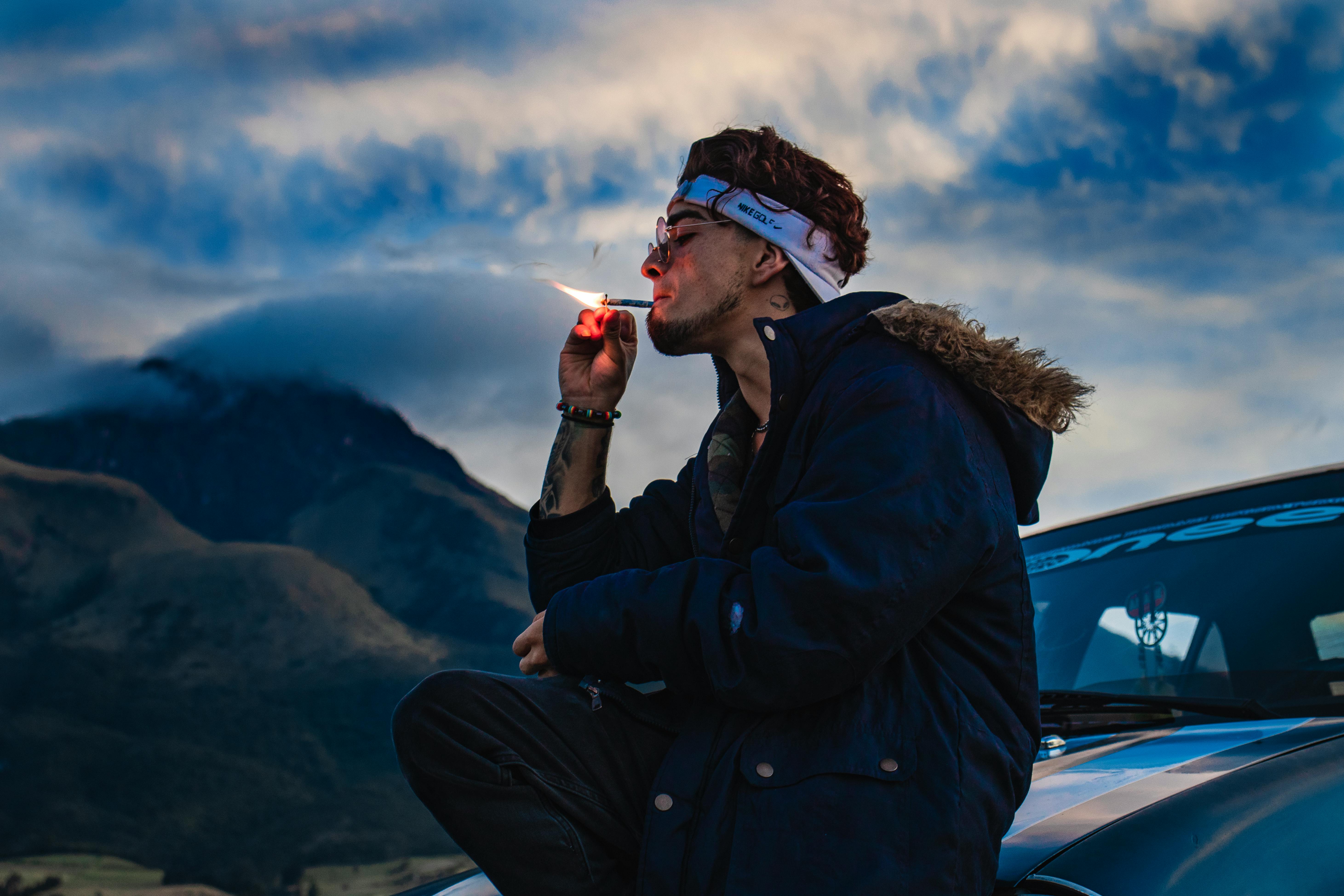 A Man in Jacket Smoking · Free Stock Photo