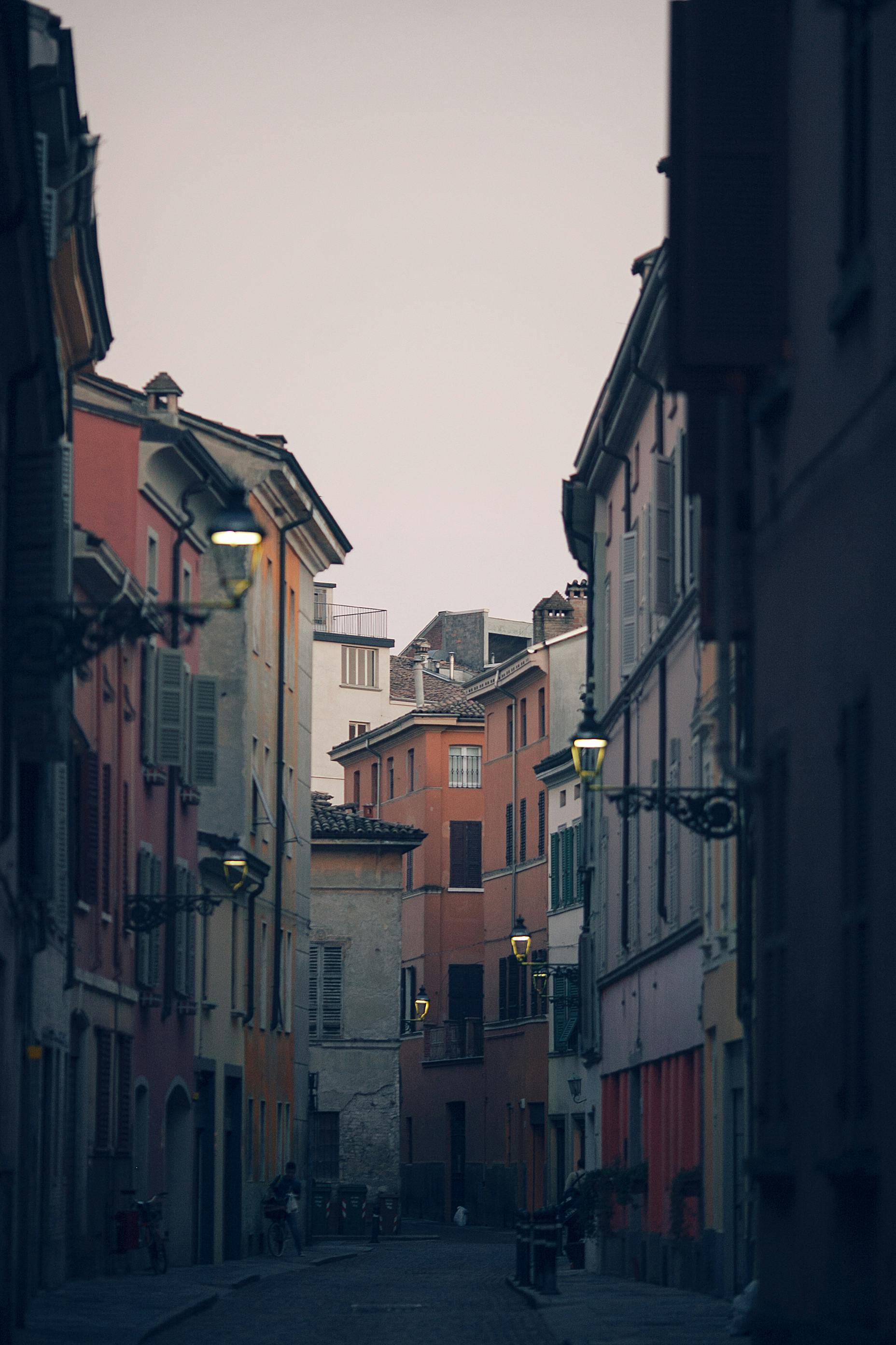 Aged city residential district with typical buildings and narrow street ...