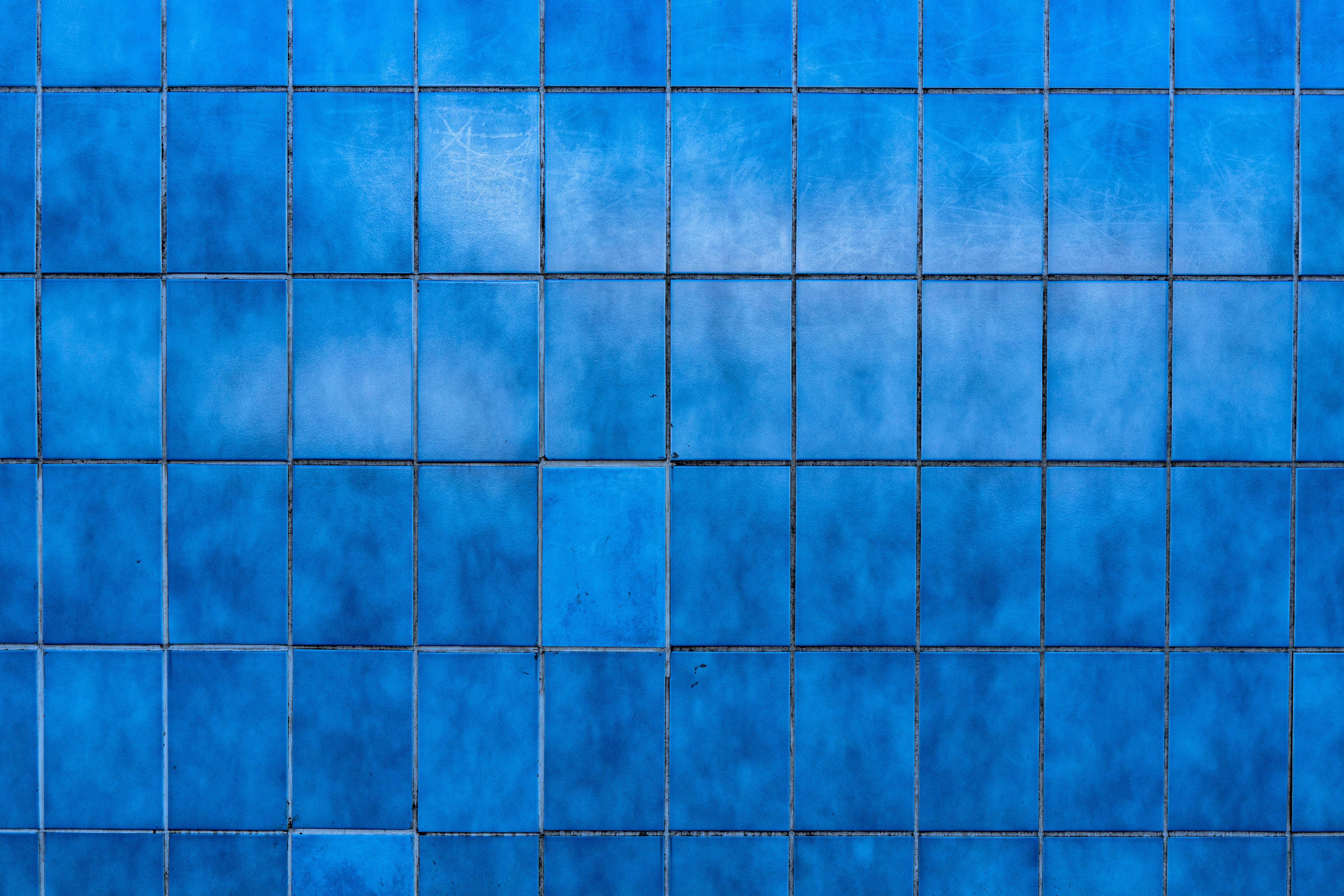 A Wall with Blue Rectangular Discolored Tiles · Free Stock Photo