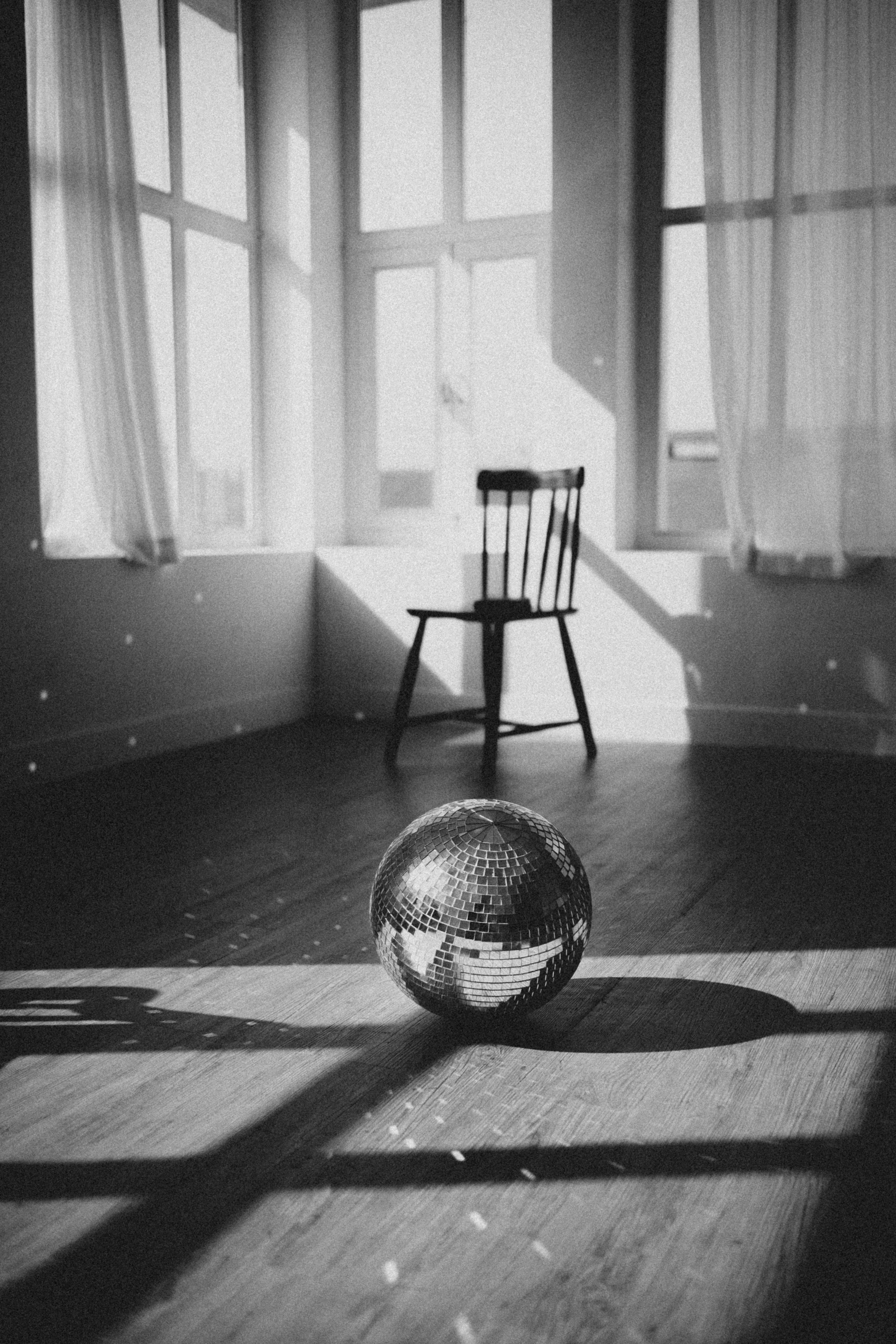 Disco ball on floor in room · Free Stock Photo