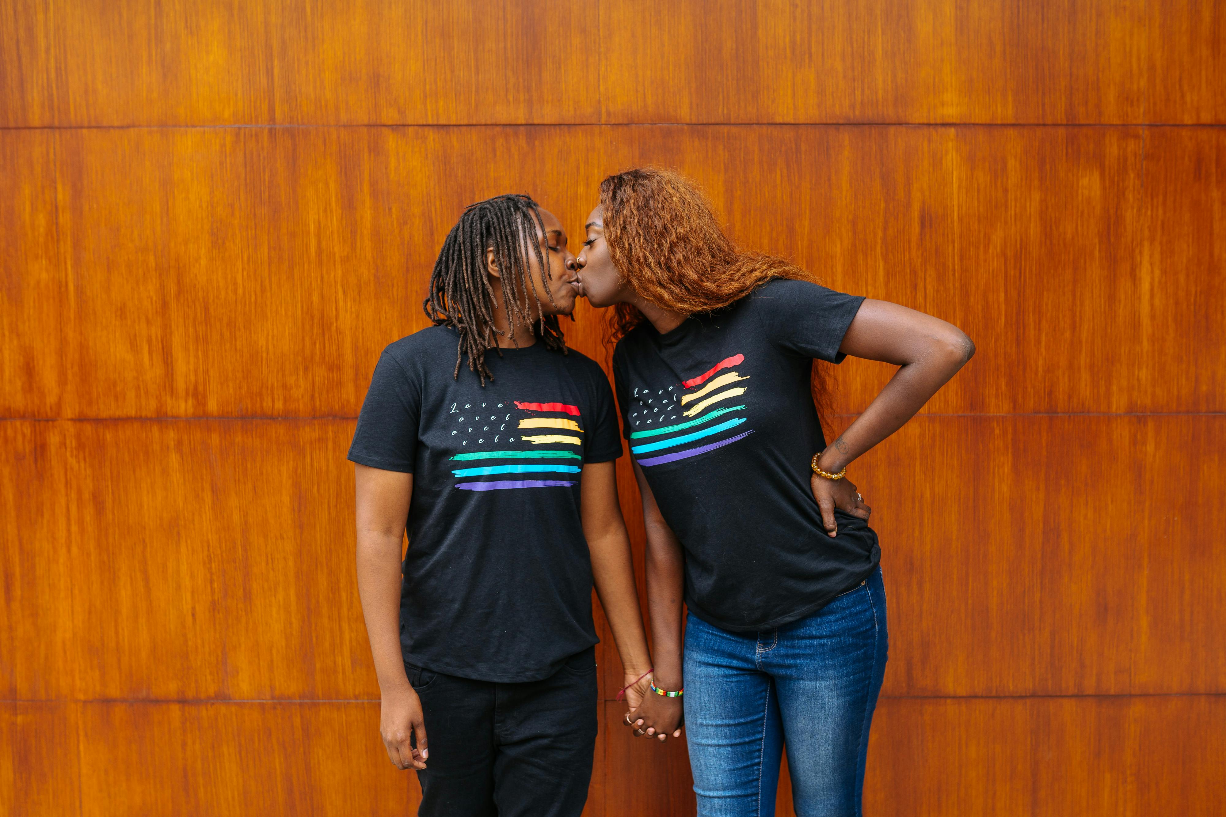 A Couple Giving a Peck on the Cheek · Free Stock Photo