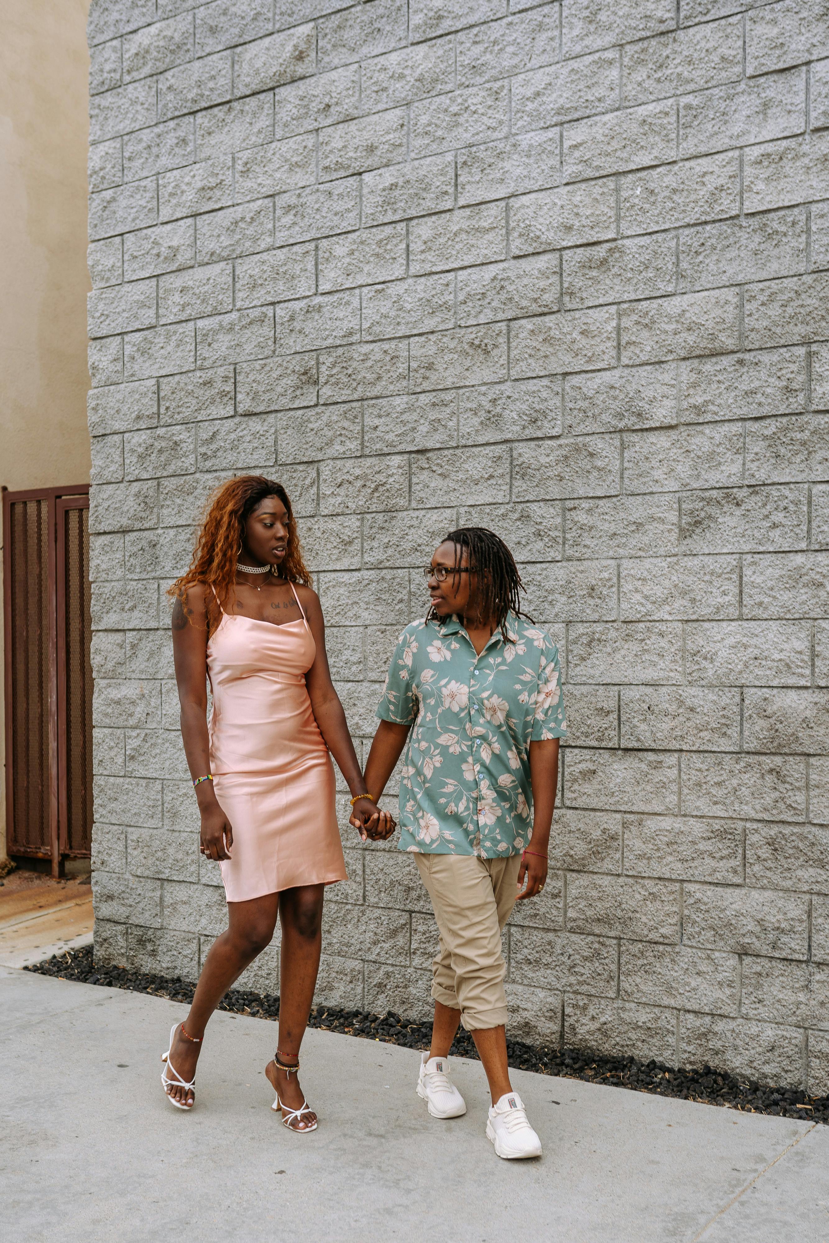 Couple Walking while Holding Hands · Free Stock Photo