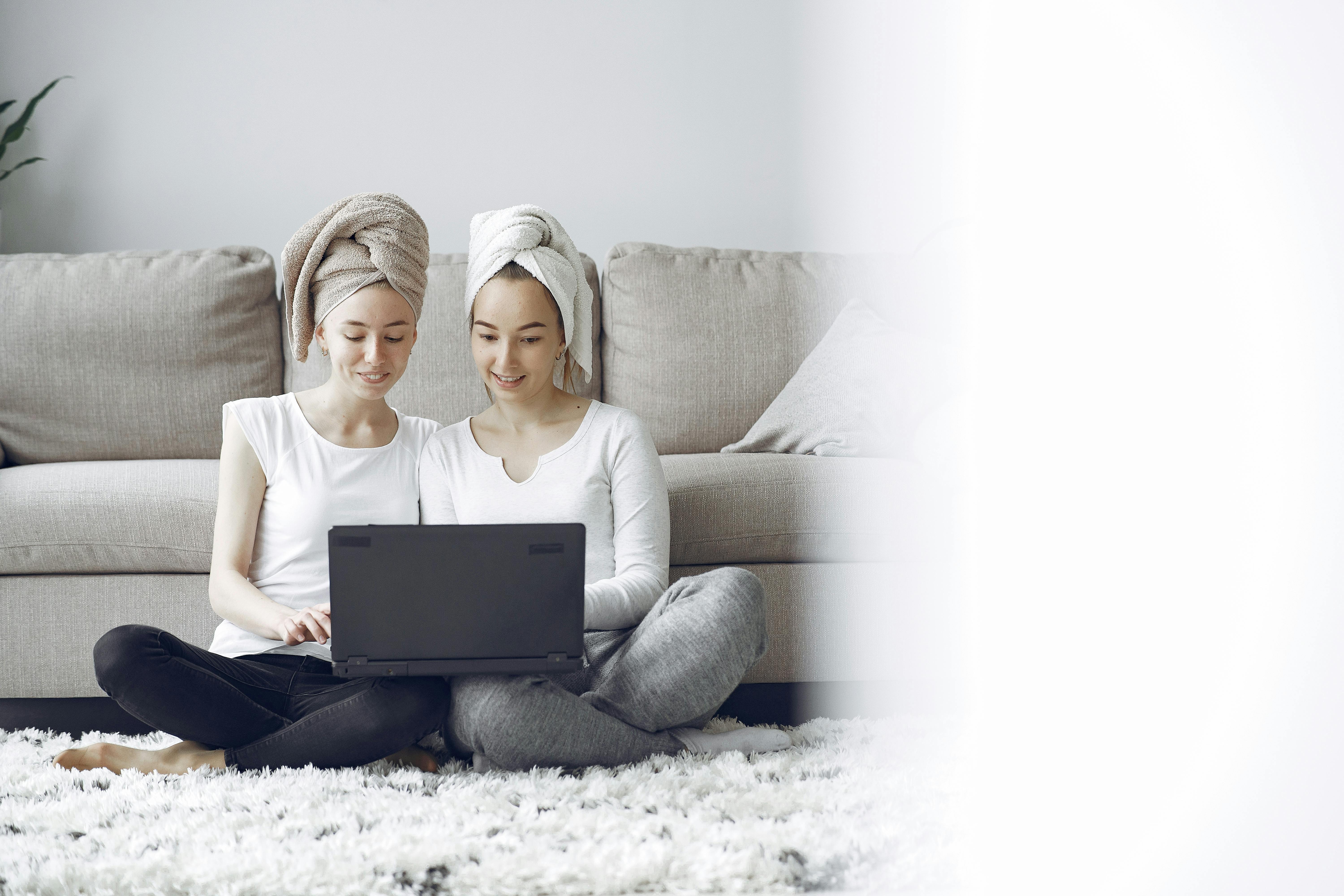 Female Friends using Laptop Together · Free Stock Photo