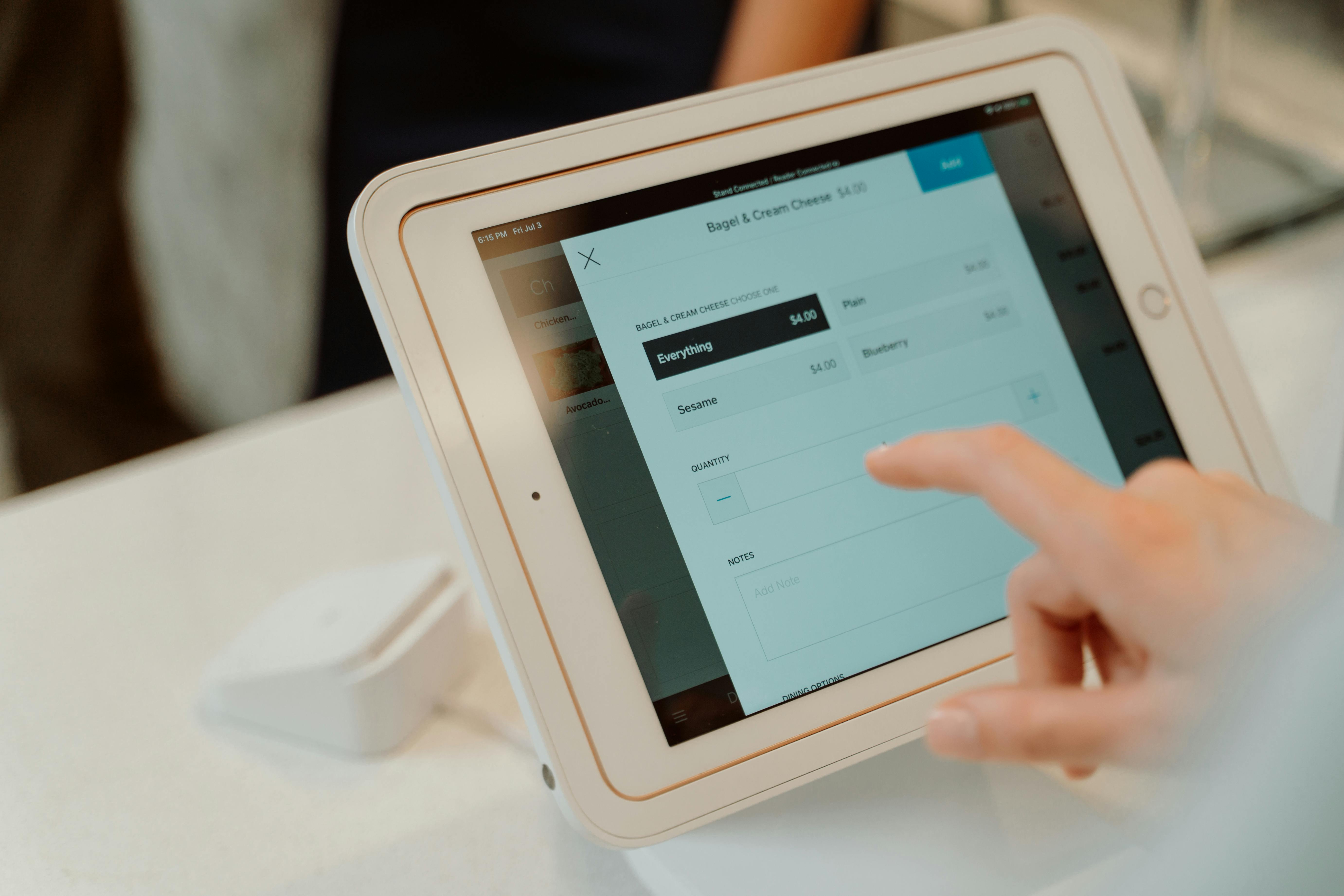 Close Up Shot of a Point of Sale Machine · Free Stock Photo