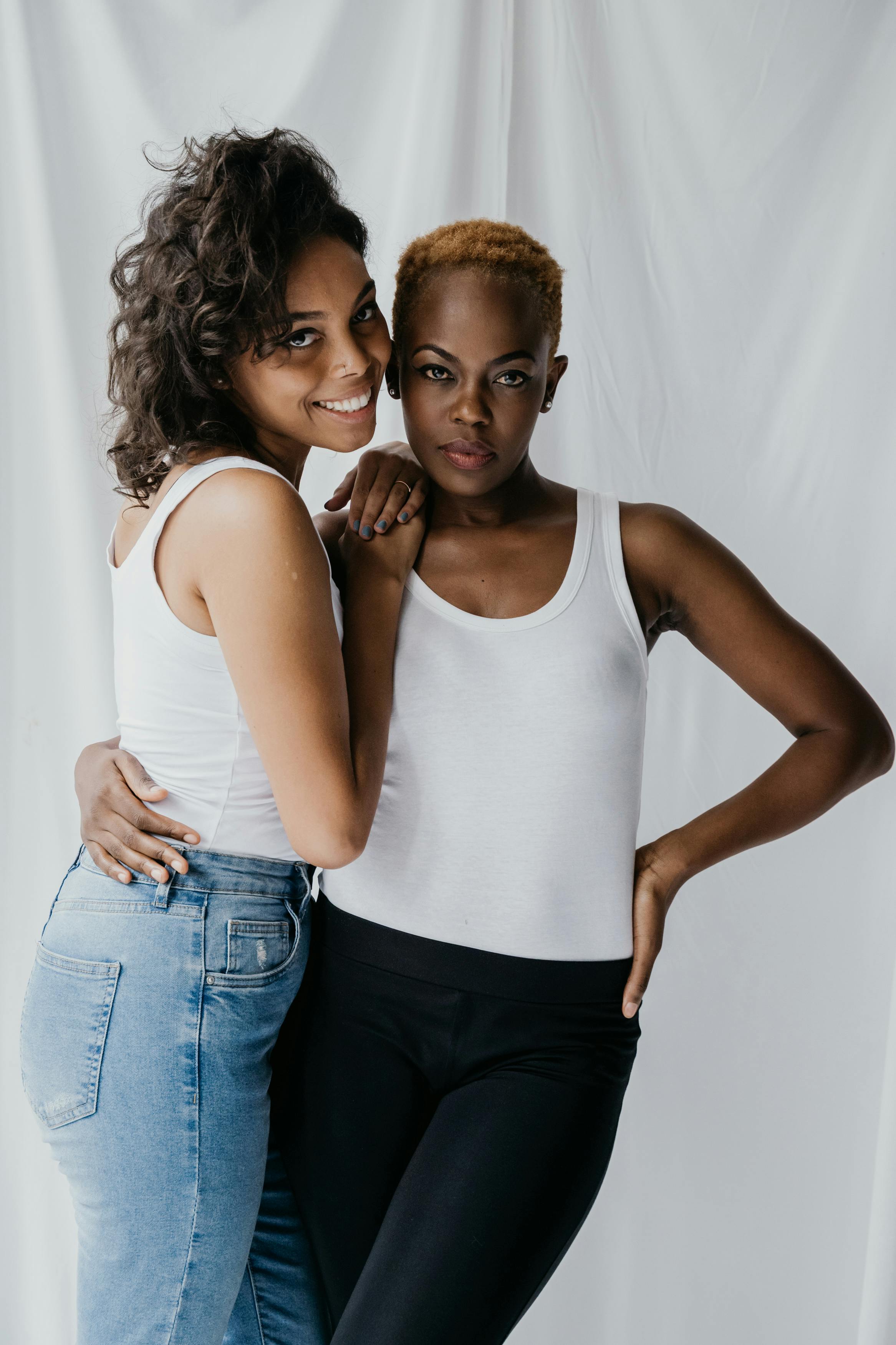 Women Wearing White Tank Tops · Free Stock Photo