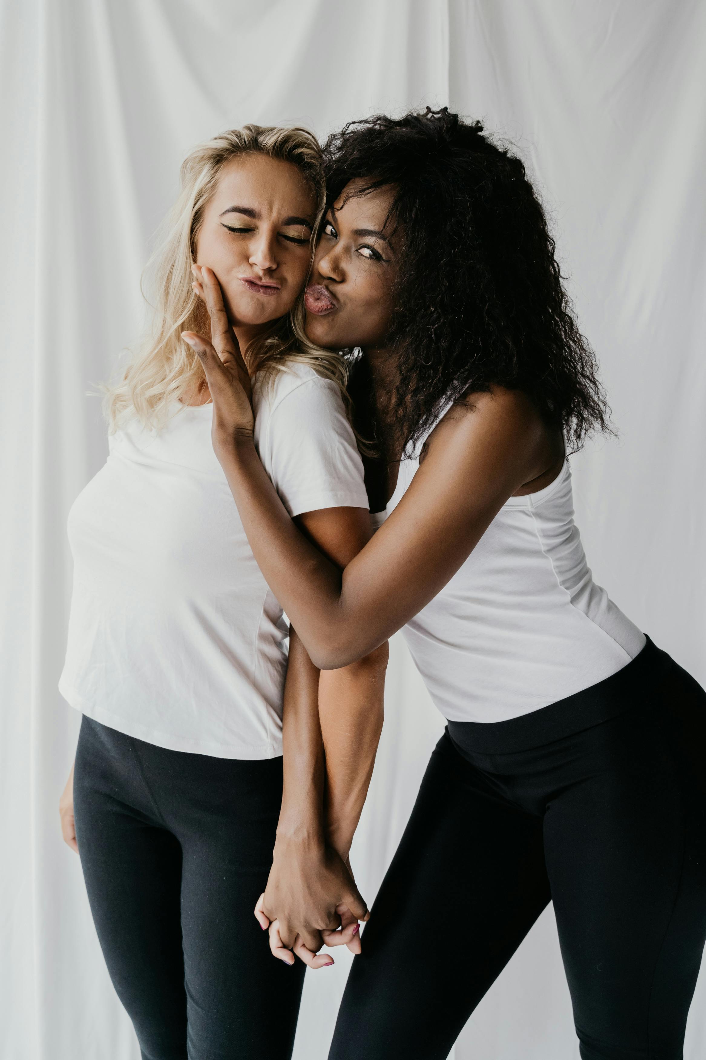 Two Women Looking at a Map · Free Stock Photo