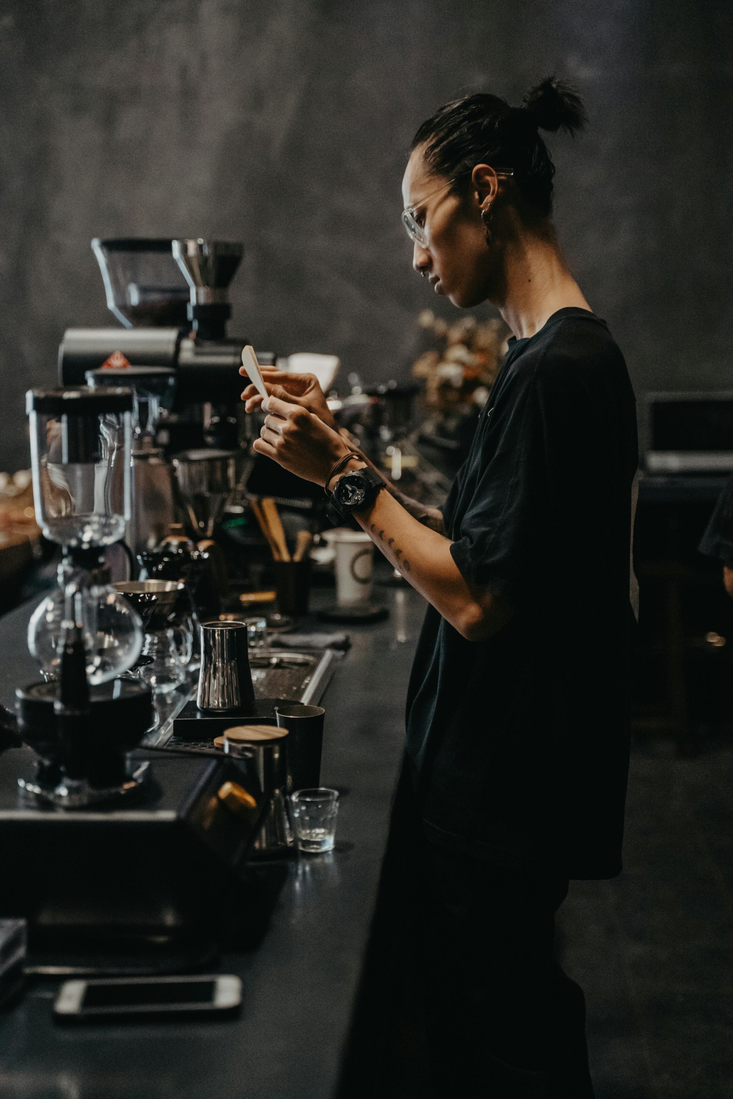 A Man Using a Coffee Machine · Free Stock Photo