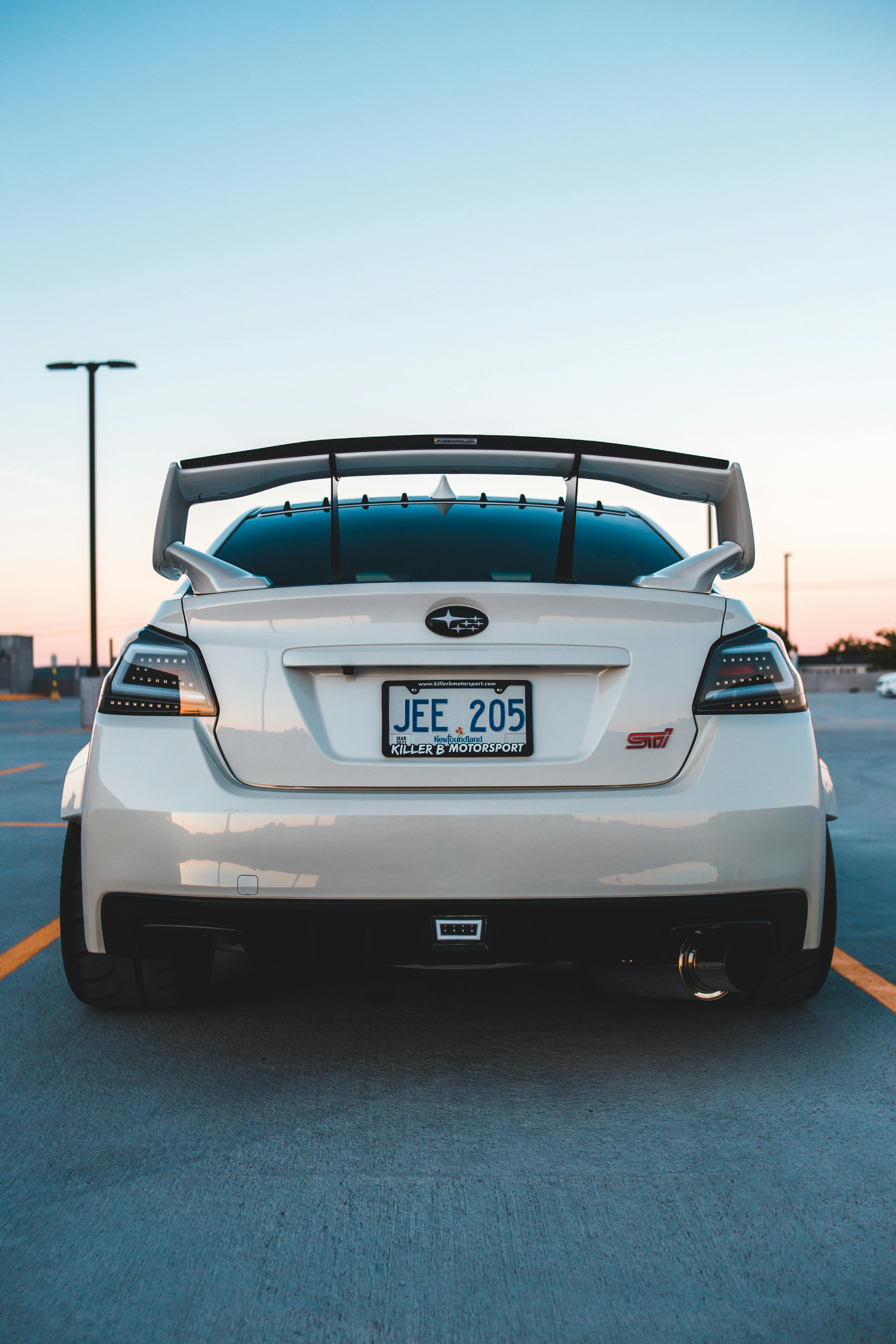 Back of modern car parked on road · Free Stock Photo