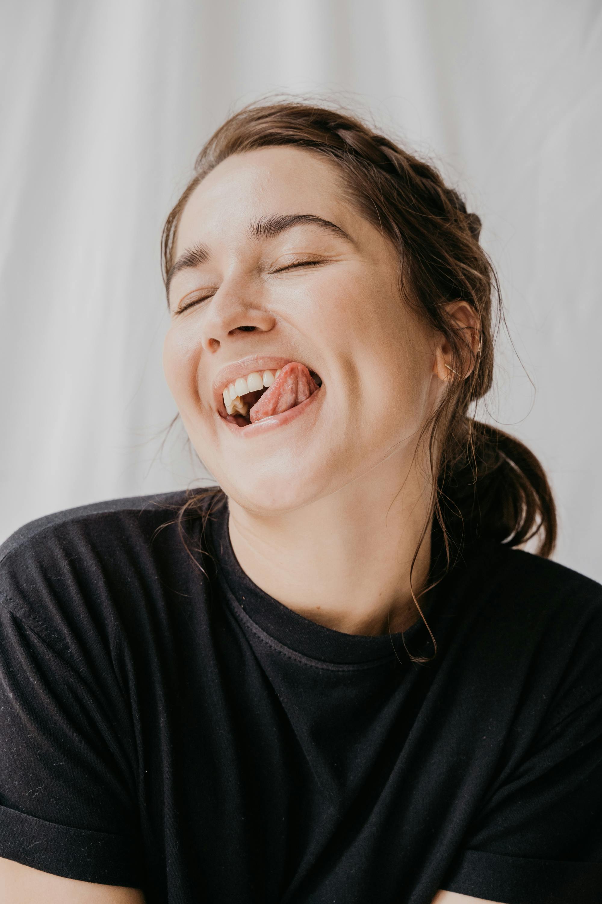 Woman Showing Tongue · Free Stock Photo